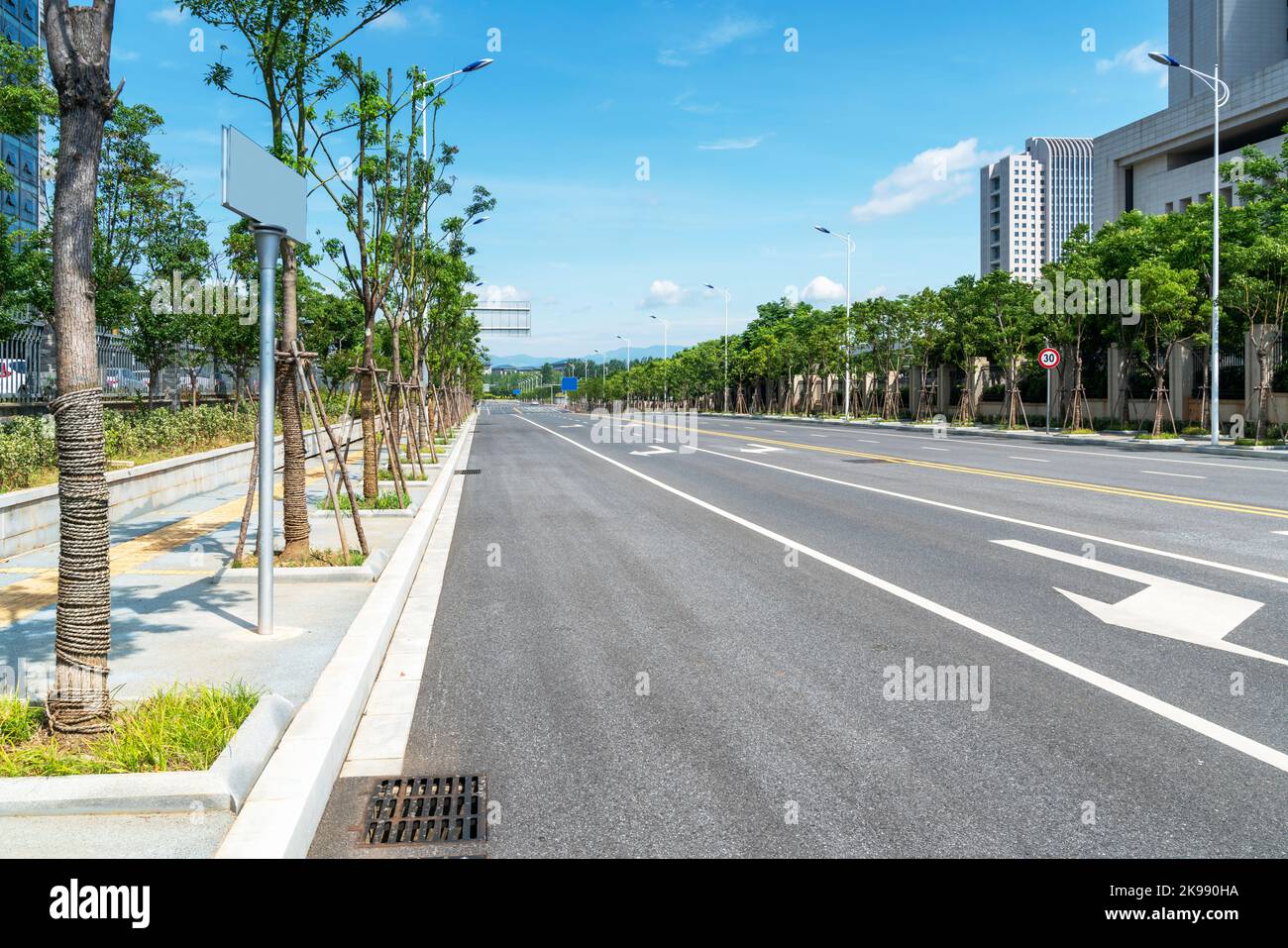 Empty urban road and buildings in the city Stock Photo - Alamy