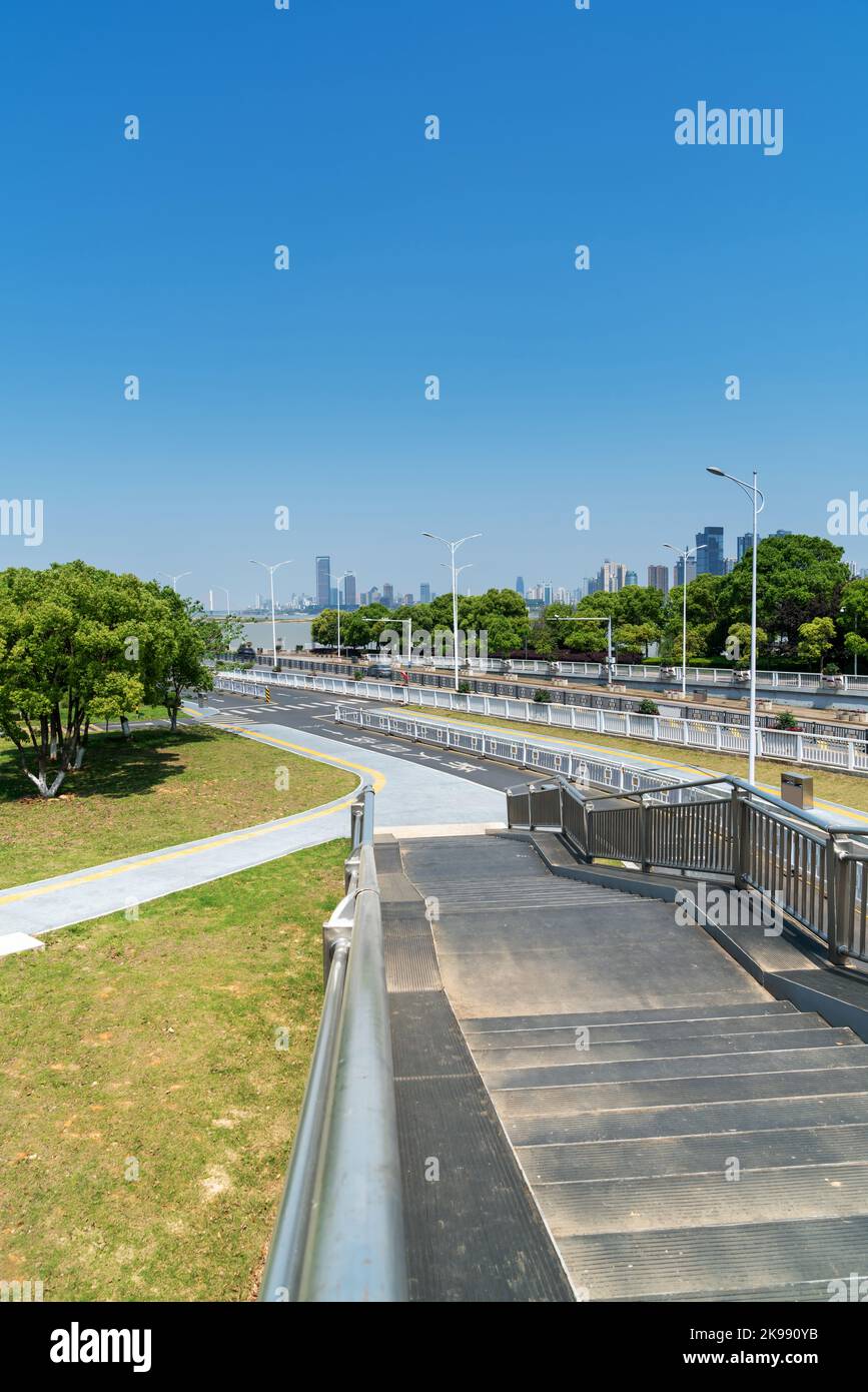 Empty urban road and buildings in the city Stock Photo - Alamy