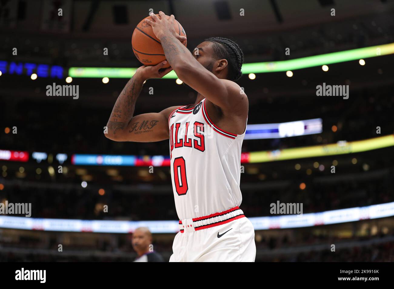 CHICAGO, IL - OCTOBER 26: Chicago Bulls guard Coby White (0) shoots a three point basket during ...