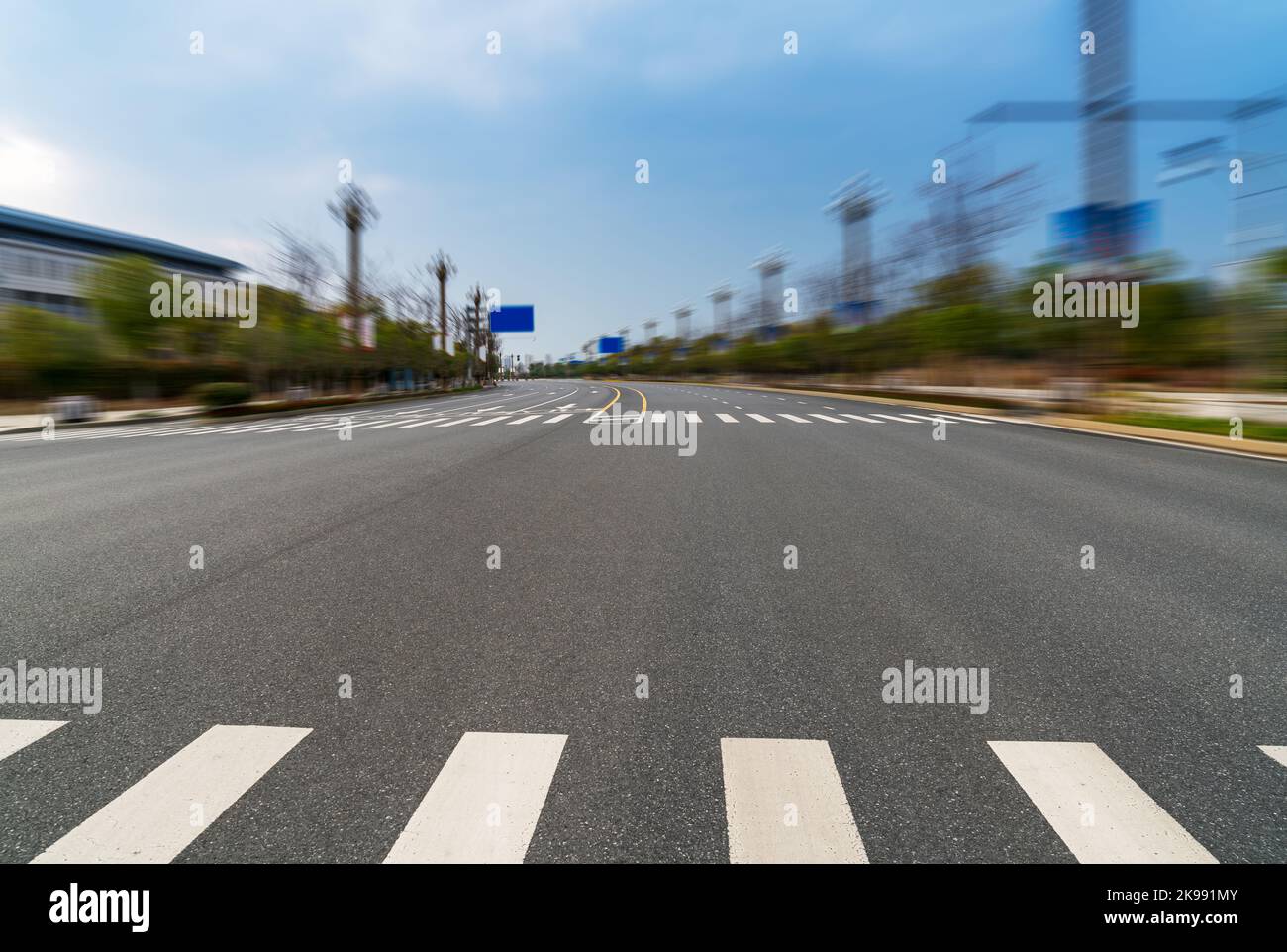Empty urban road and buildings in China Stock Photo - Alamy