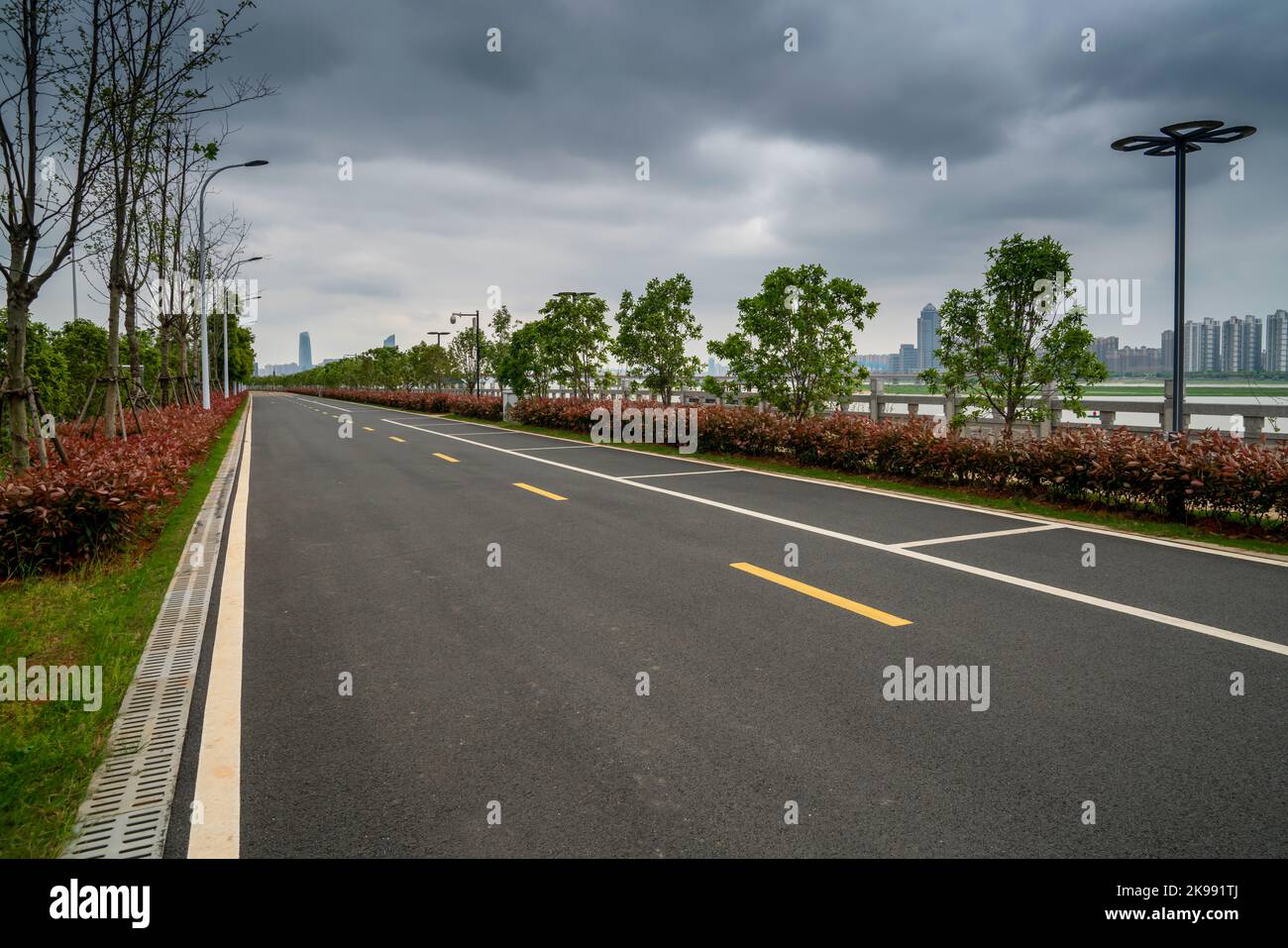 Empty urban road and buildings in China Stock Photo - Alamy