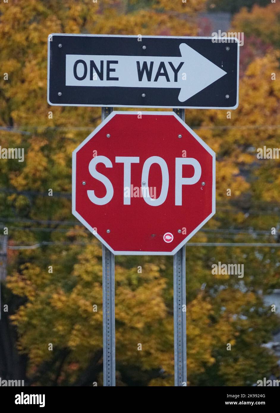 Corning, New York, U.S.A - October 18, 2022 - A stop sign and one way ...