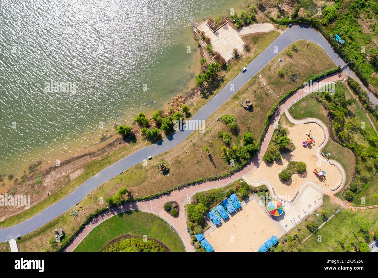 Aerial view of road by the lake Stock Photo - Alamy