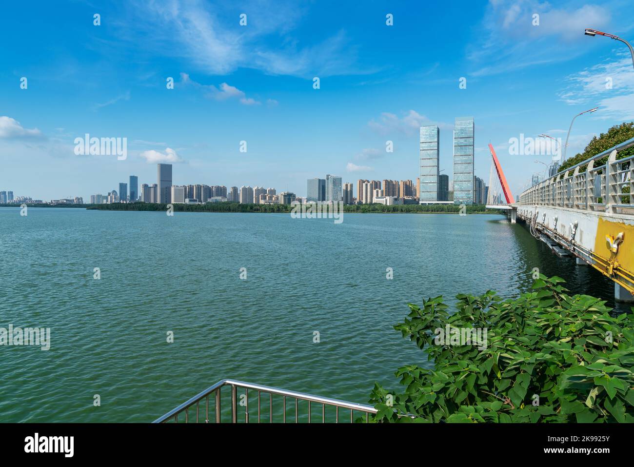 Lakeside modern office building in China Stock Photo - Alamy