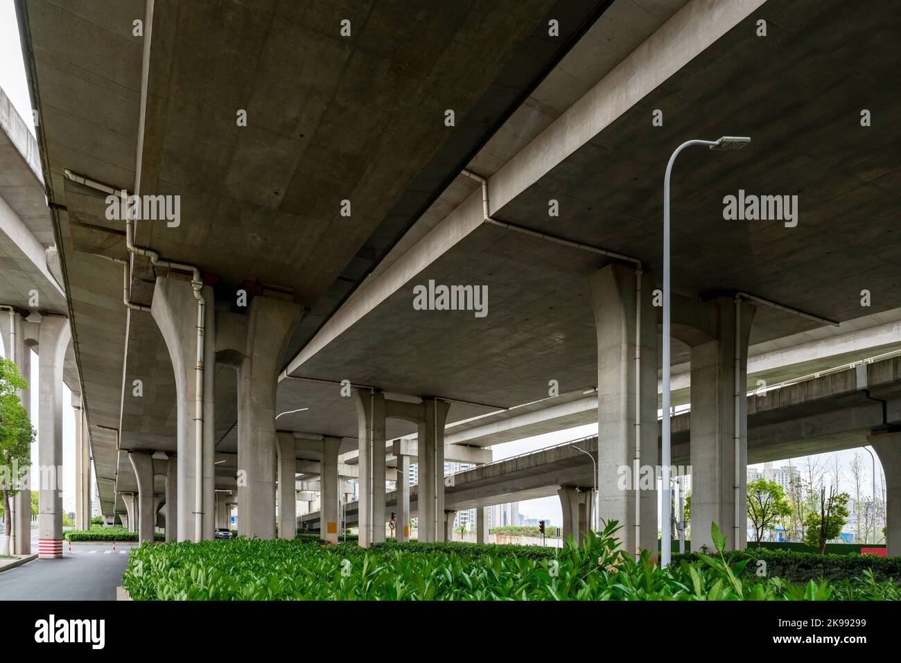 Concrete structure and asphalt road space under the overpass in the ...