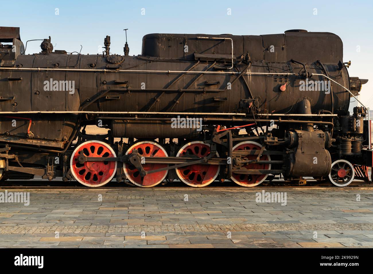 Old steam engine train and parts close-up Stock Photo - Alamy