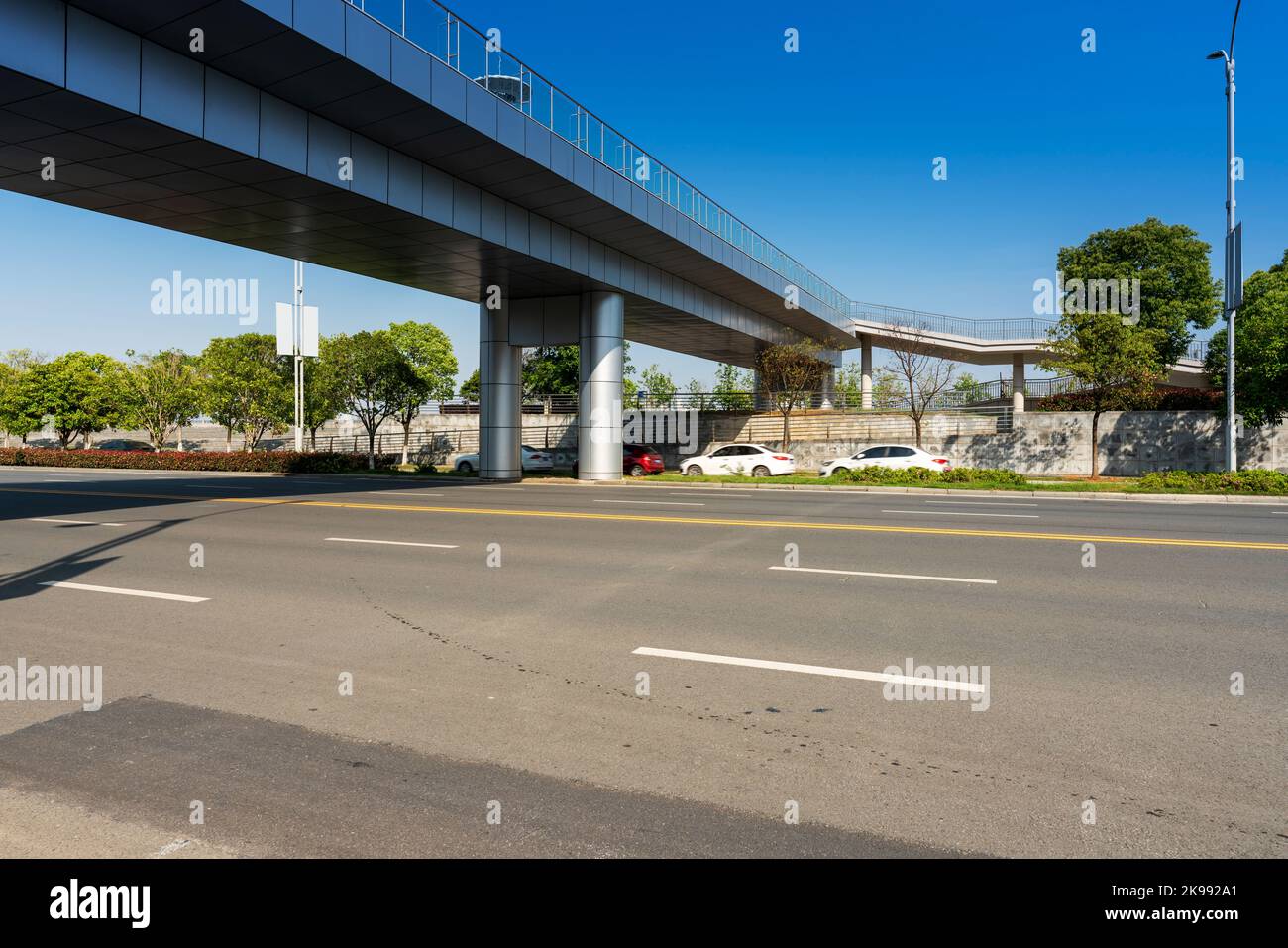 Concrete structure and asphalt road space under the overpass in the ...