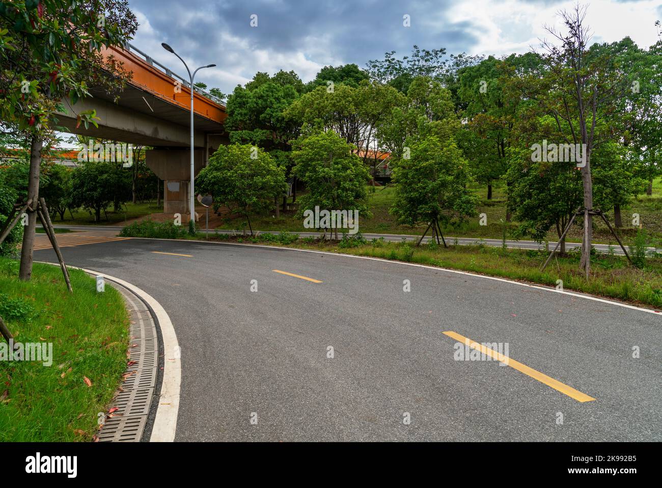 Concrete structure and asphalt road space under the overpass in the ...