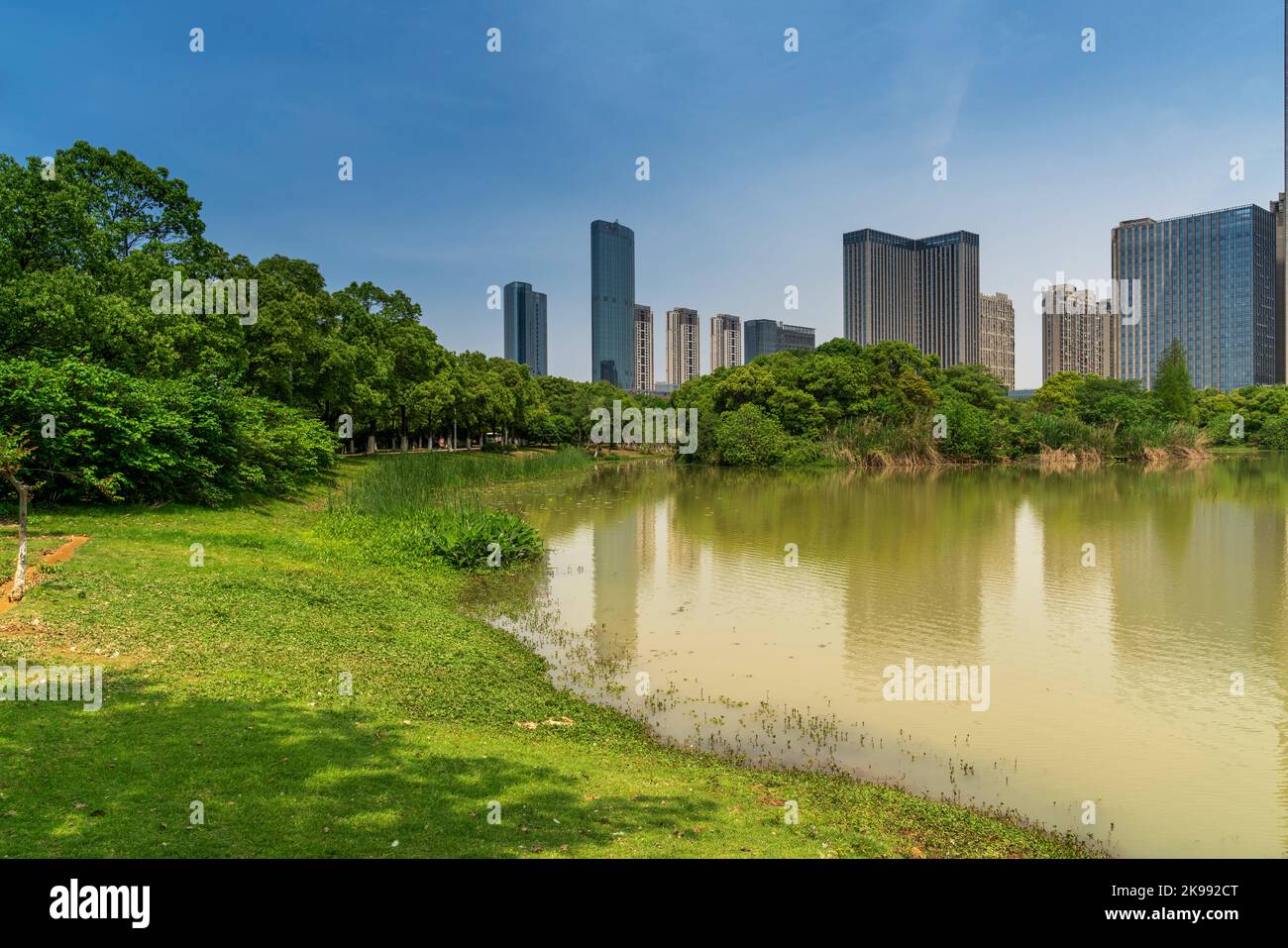 Lakeside modern office building in China Stock Photo - Alamy