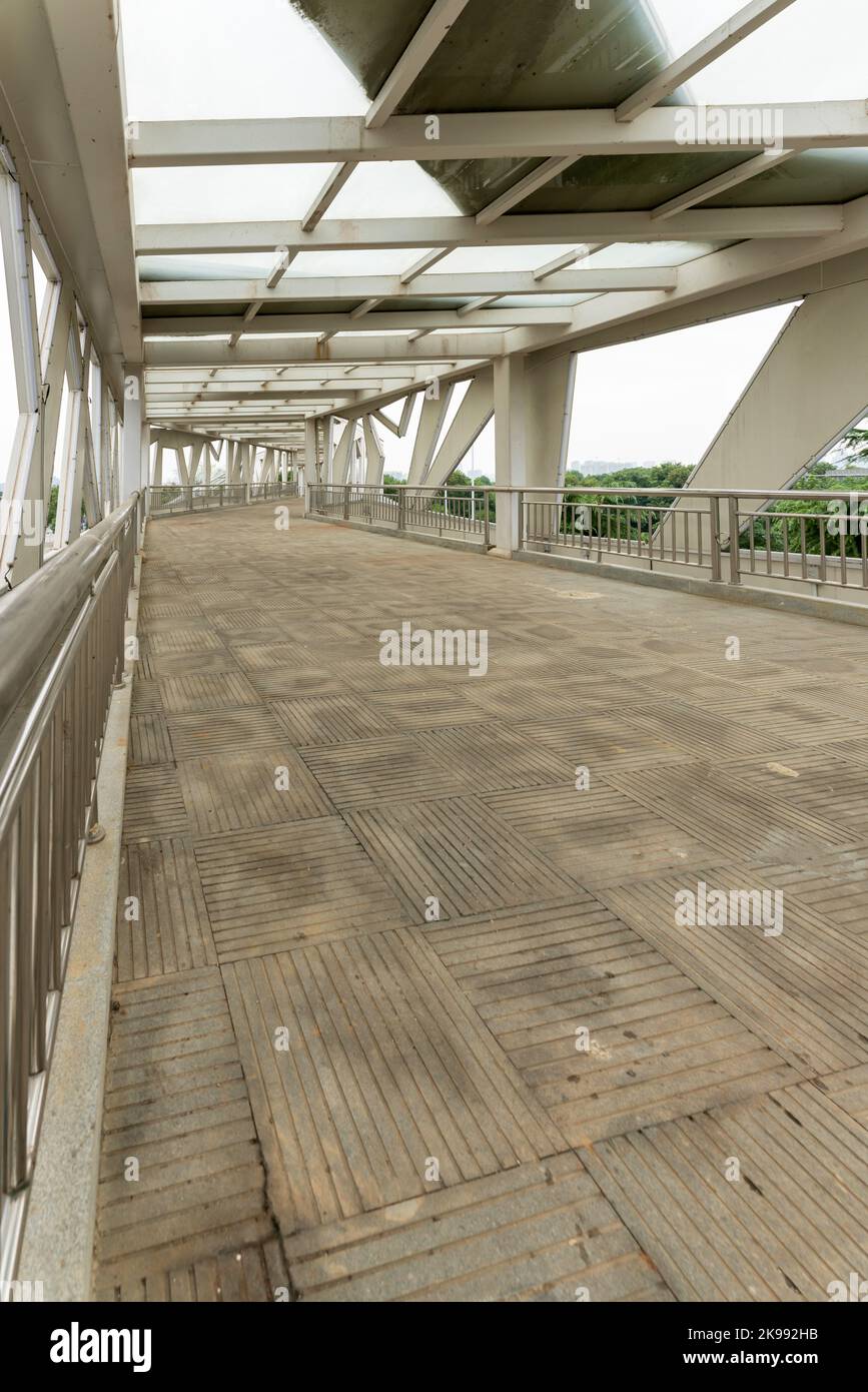 Inside of a modern overhead pedestrian bridge Stock Photo - Alamy