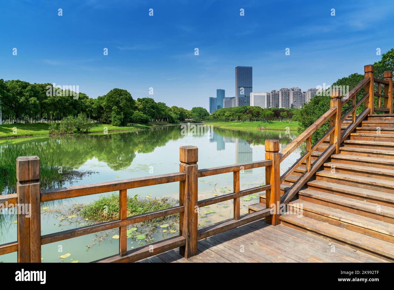 Lakeside modern office building in China Stock Photo - Alamy