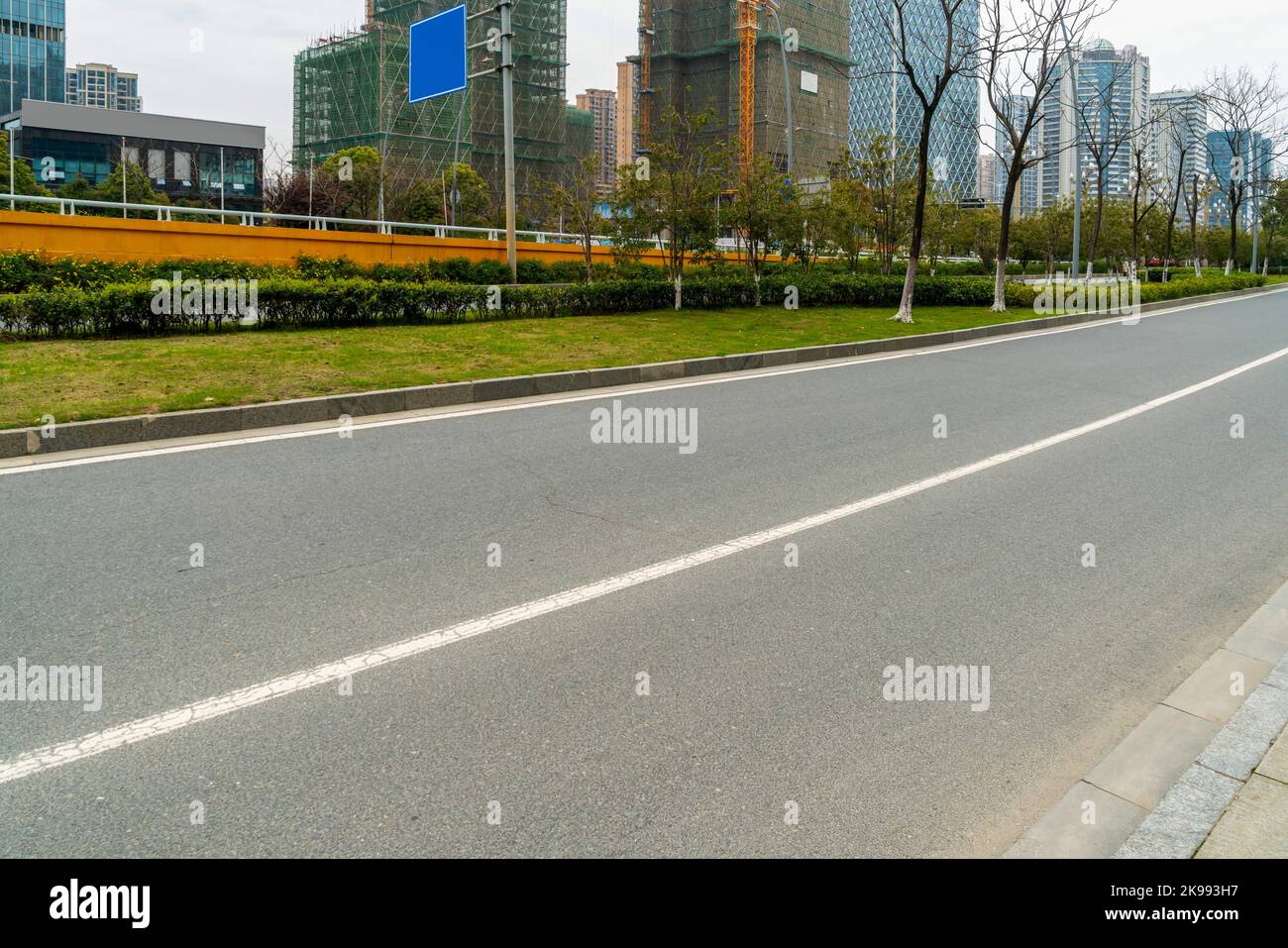 Empty urban road and buildings in China Stock Photo - Alamy