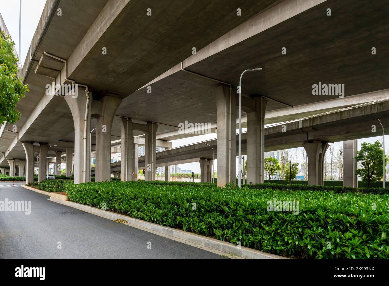 Concrete structure and asphalt road space under the overpass in the ...