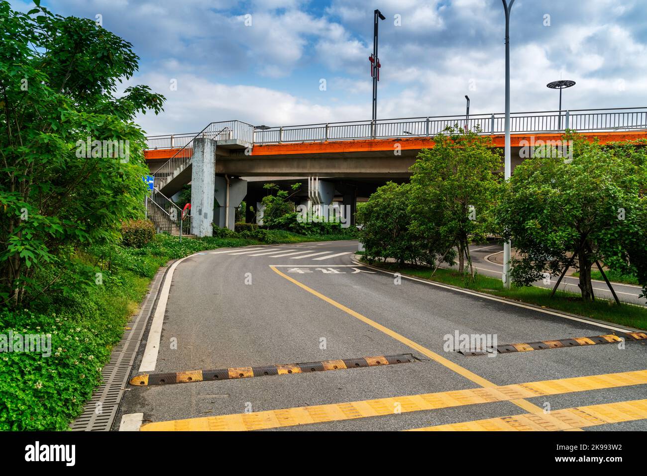 Concrete structure and asphalt road space under the overpass in the ...