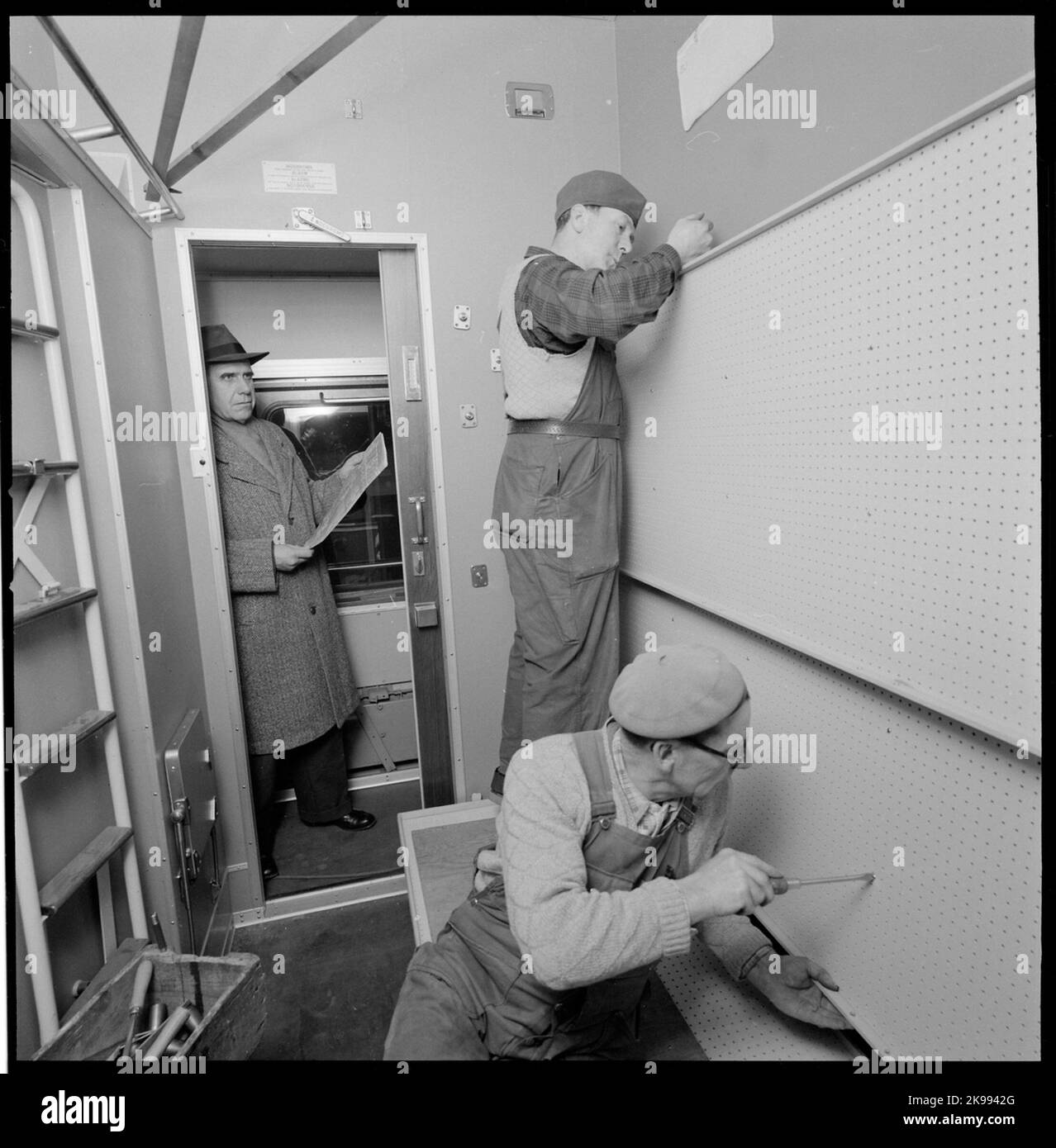 Mounting work in sleeping compartment Stock Photo - Alamy