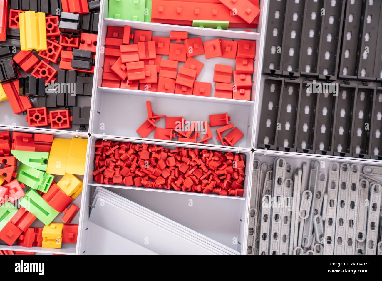 Set for assembling mechanical toys. Children's set of plastic parts for ...