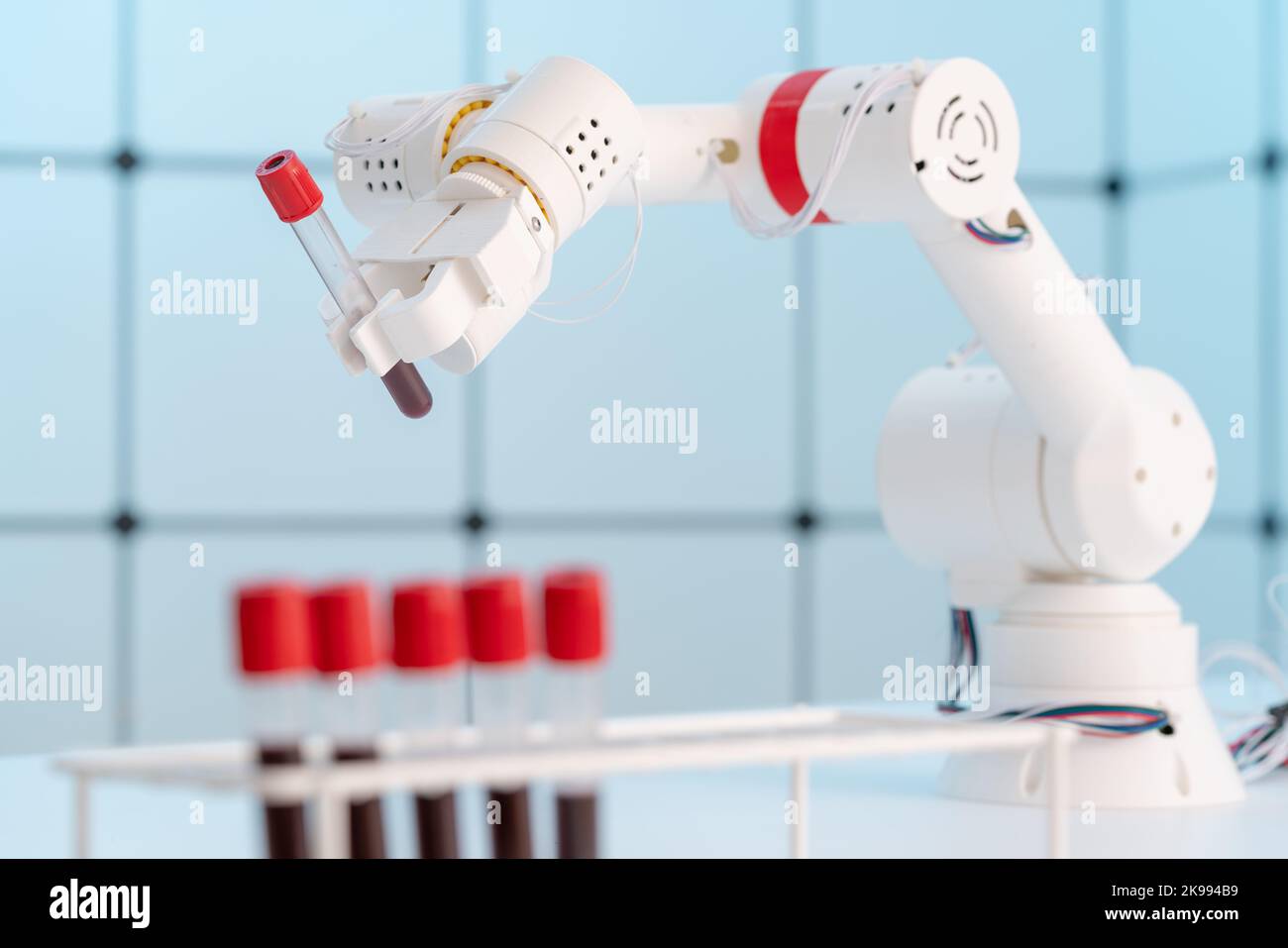 Robot arm with test tube for biological experiments in laboratory Stock ...