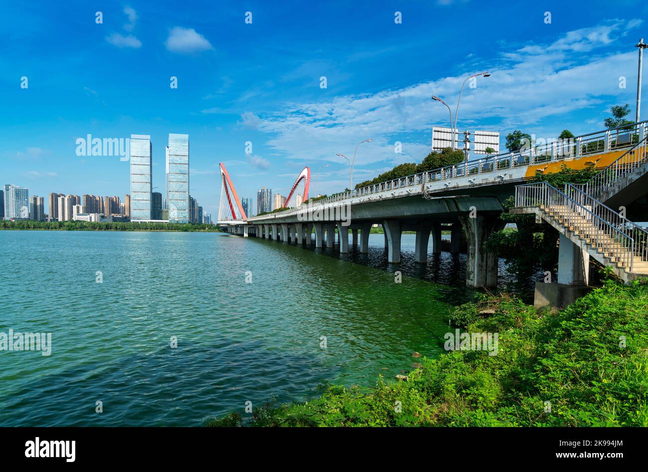 Lakeside modern office building in China Stock Photo - Alamy