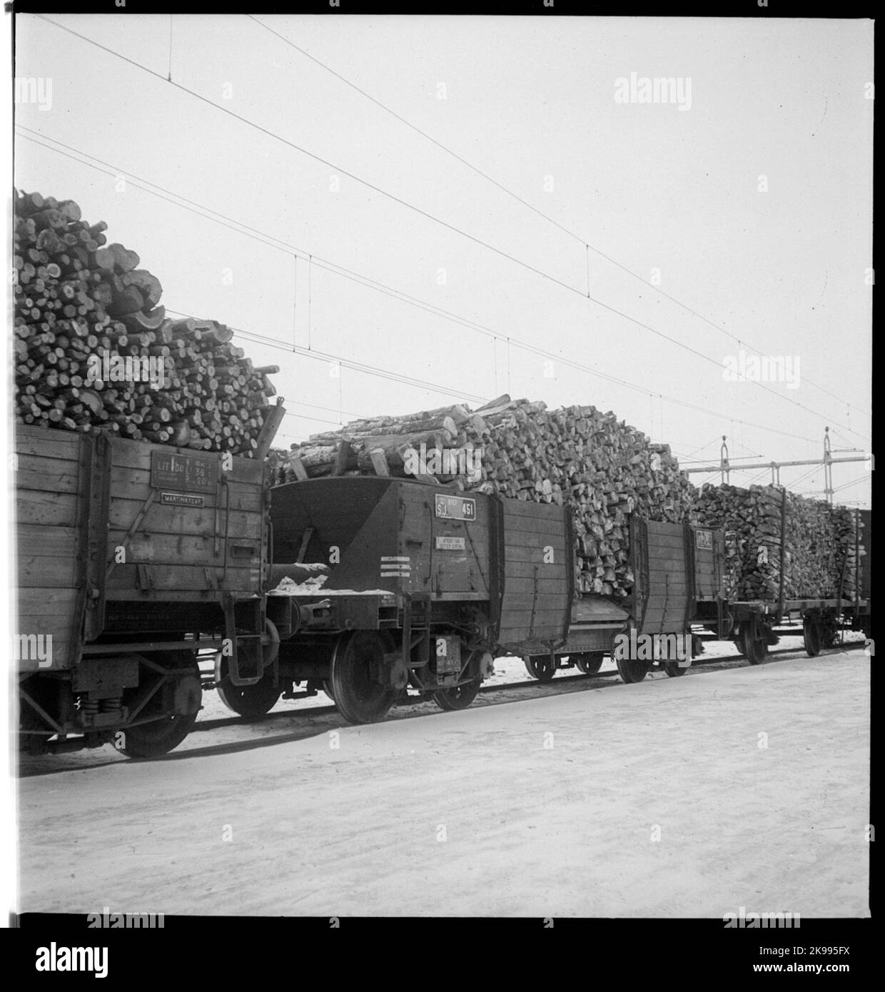 Loaded freight wagons at yard. The freight wagon in the middle is the ...
