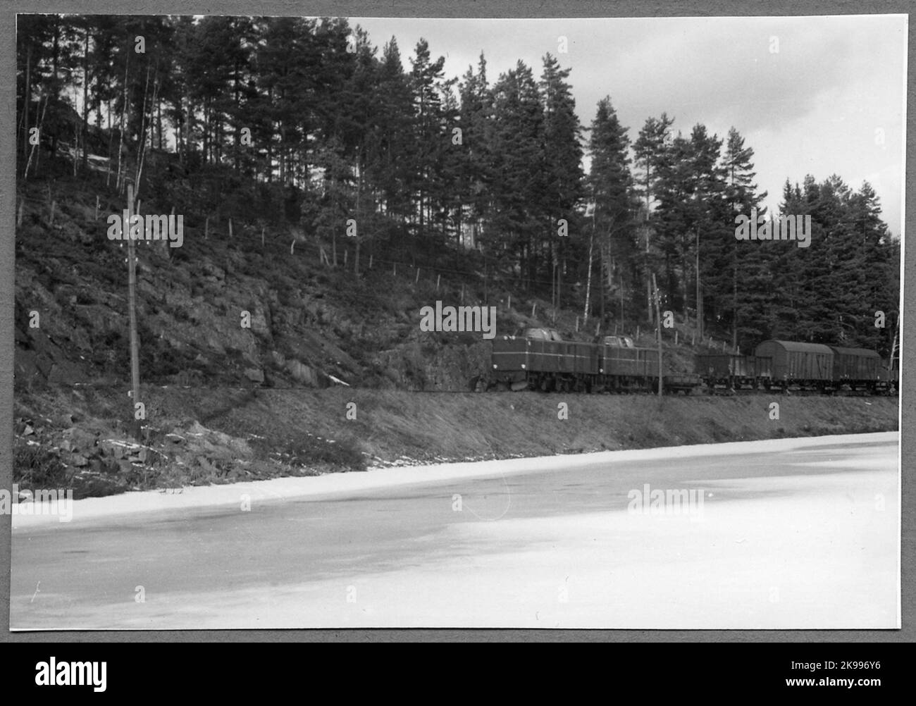 Two TP diesel locomotives with wagons on the line between Hjorted and ...