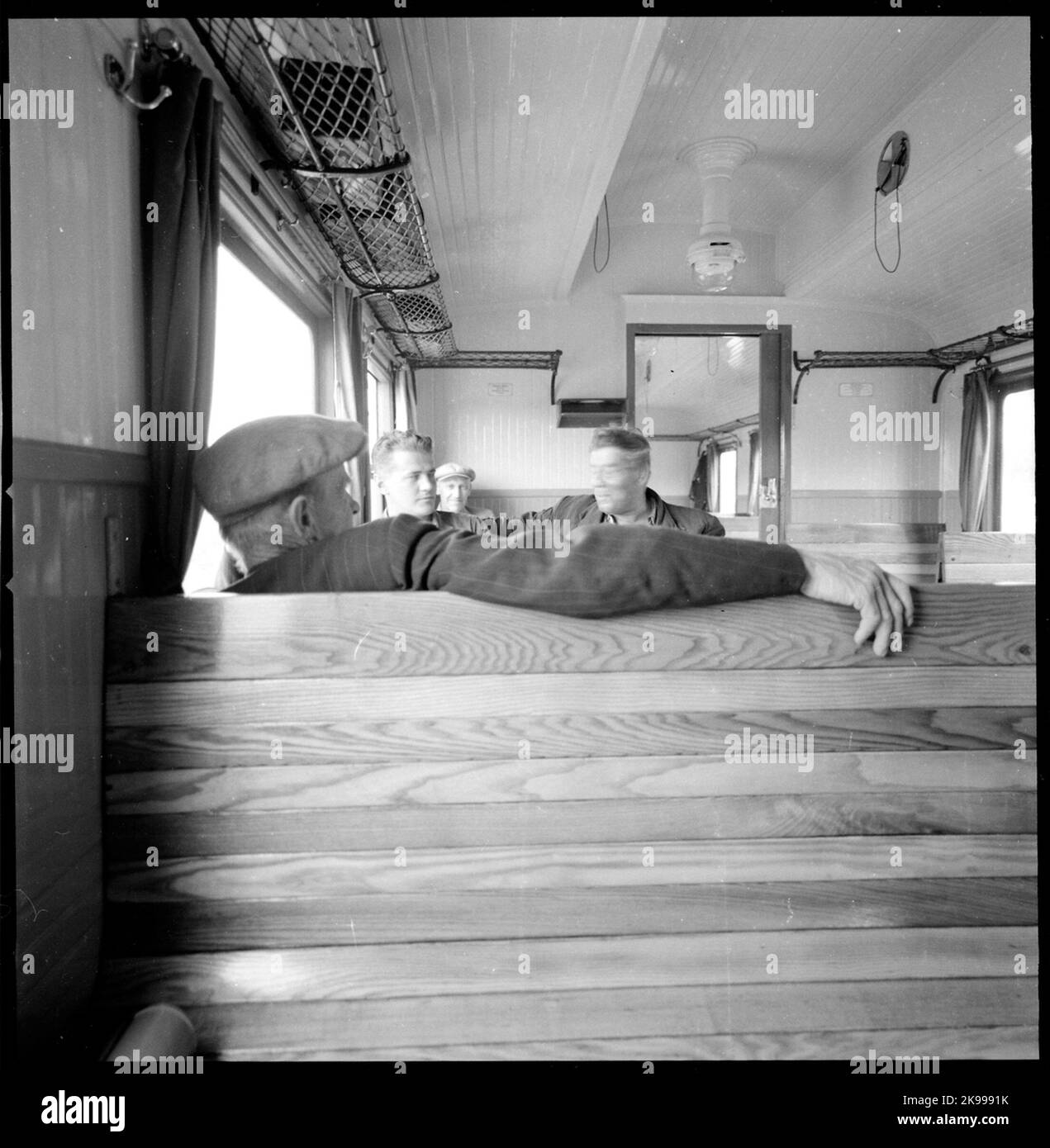 Train travelers in, State Railways, SJ freight wagon, 3rd grade Stock ...