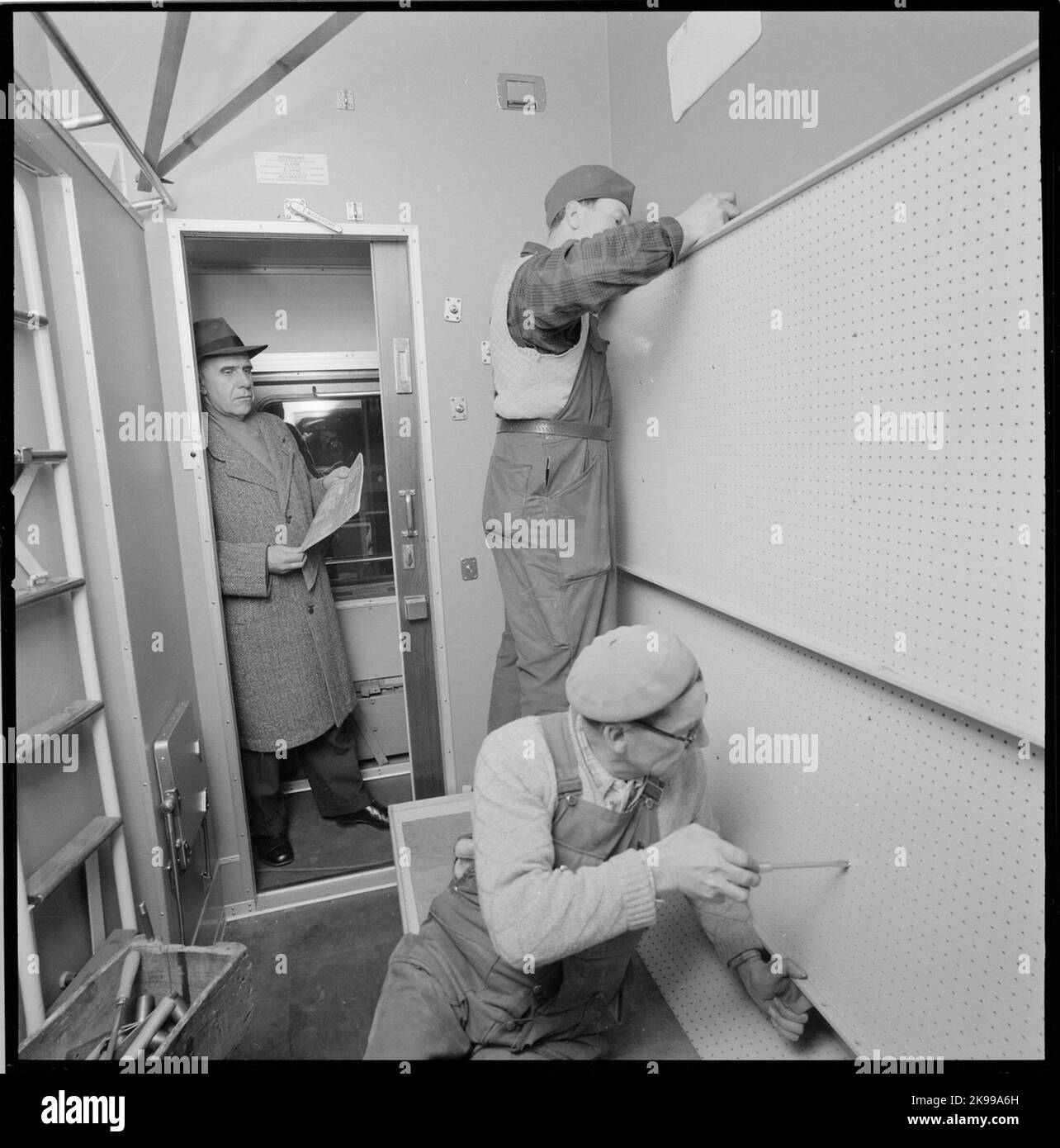 Mounting work in sleeping compartment Stock Photo - Alamy
