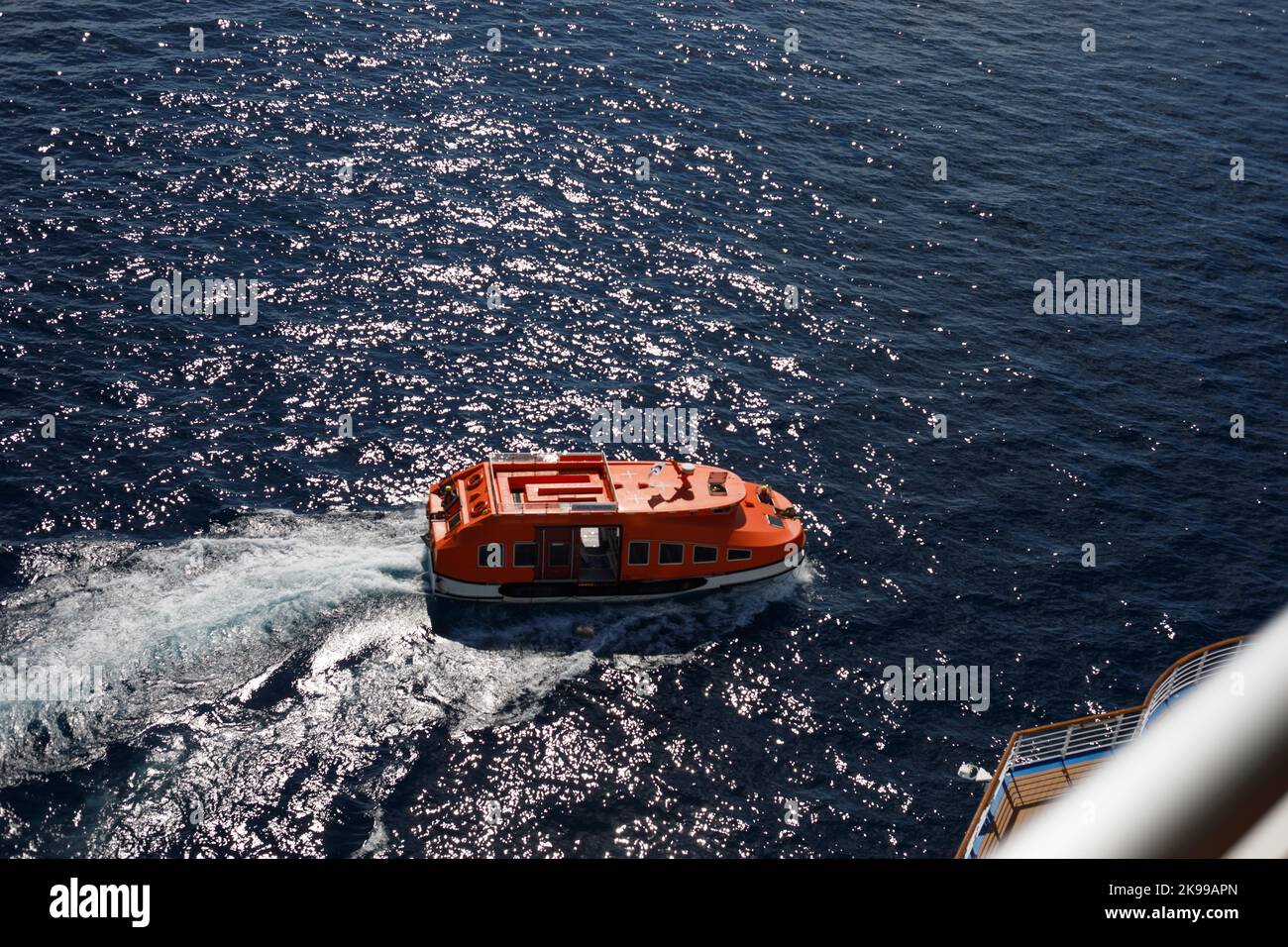 Cruise ship tender boat leaving the ship Stock Photo - Alamy