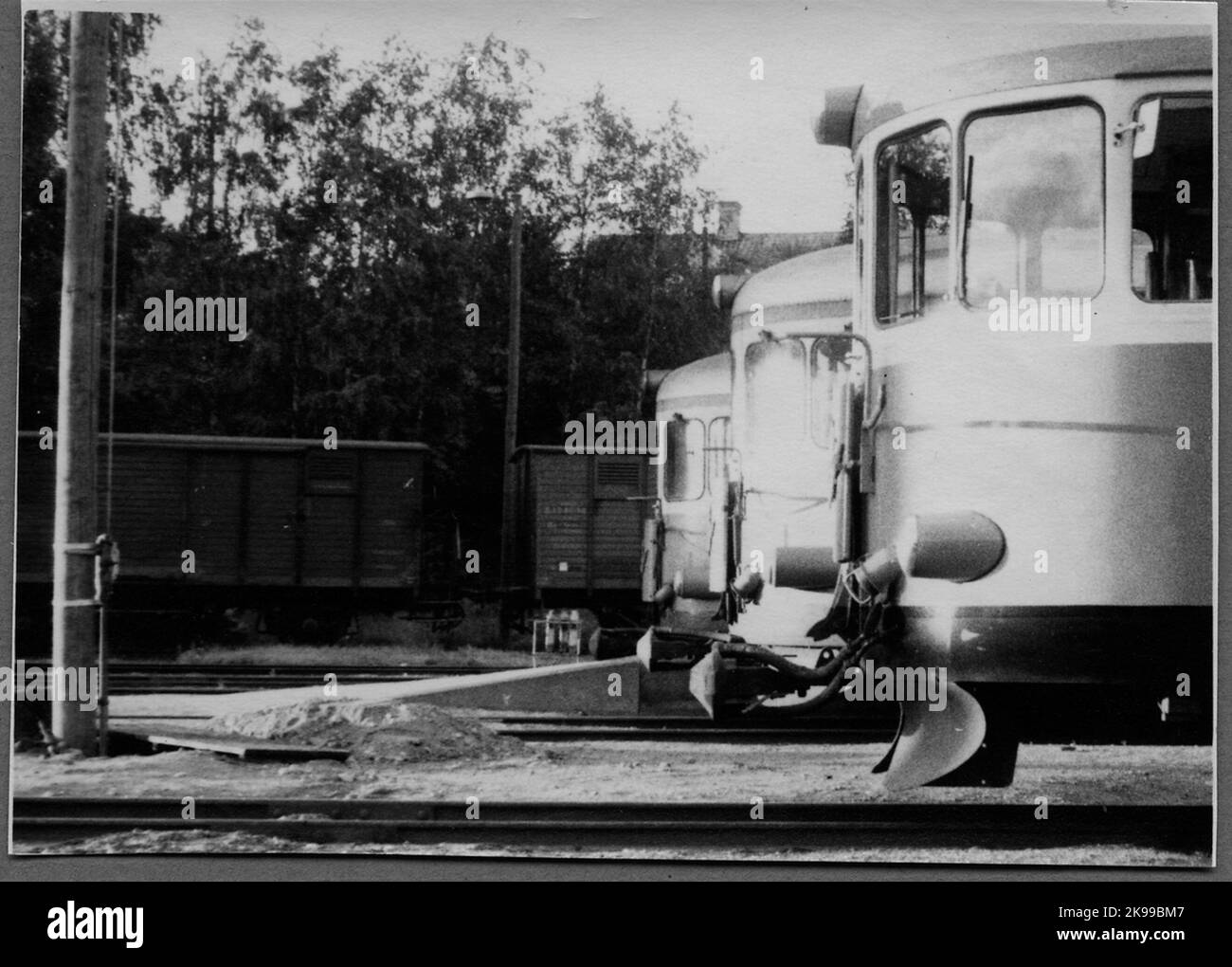 Normal track and narrow motor cars in Åtvidaberg Stock Photo - Alamy