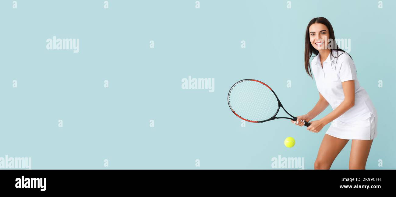 Beautiful tennis player on light blue background with space for text ...