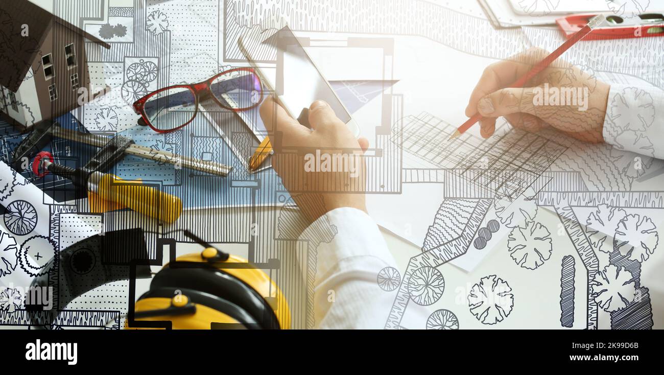 Double exposure of drawing and male architect working in office ...