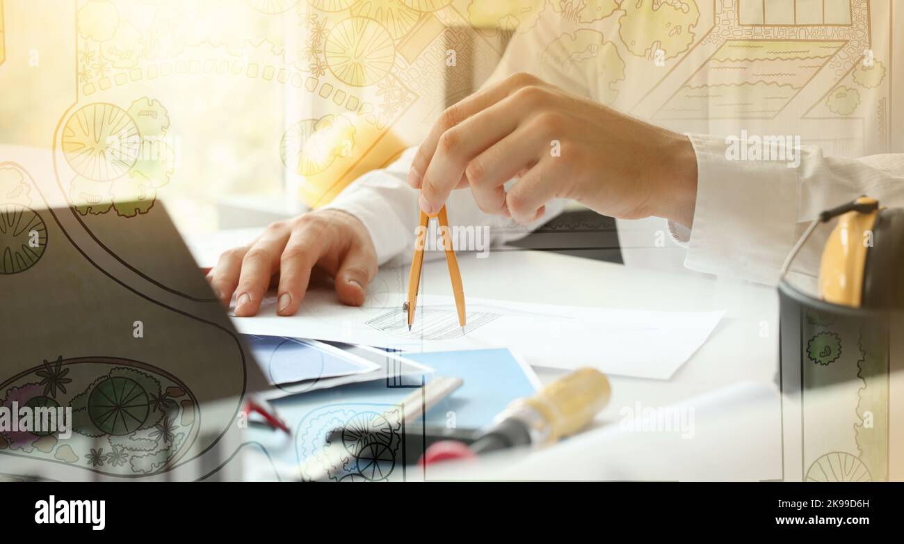 Double exposure of drawing and male architect working at table Stock ...