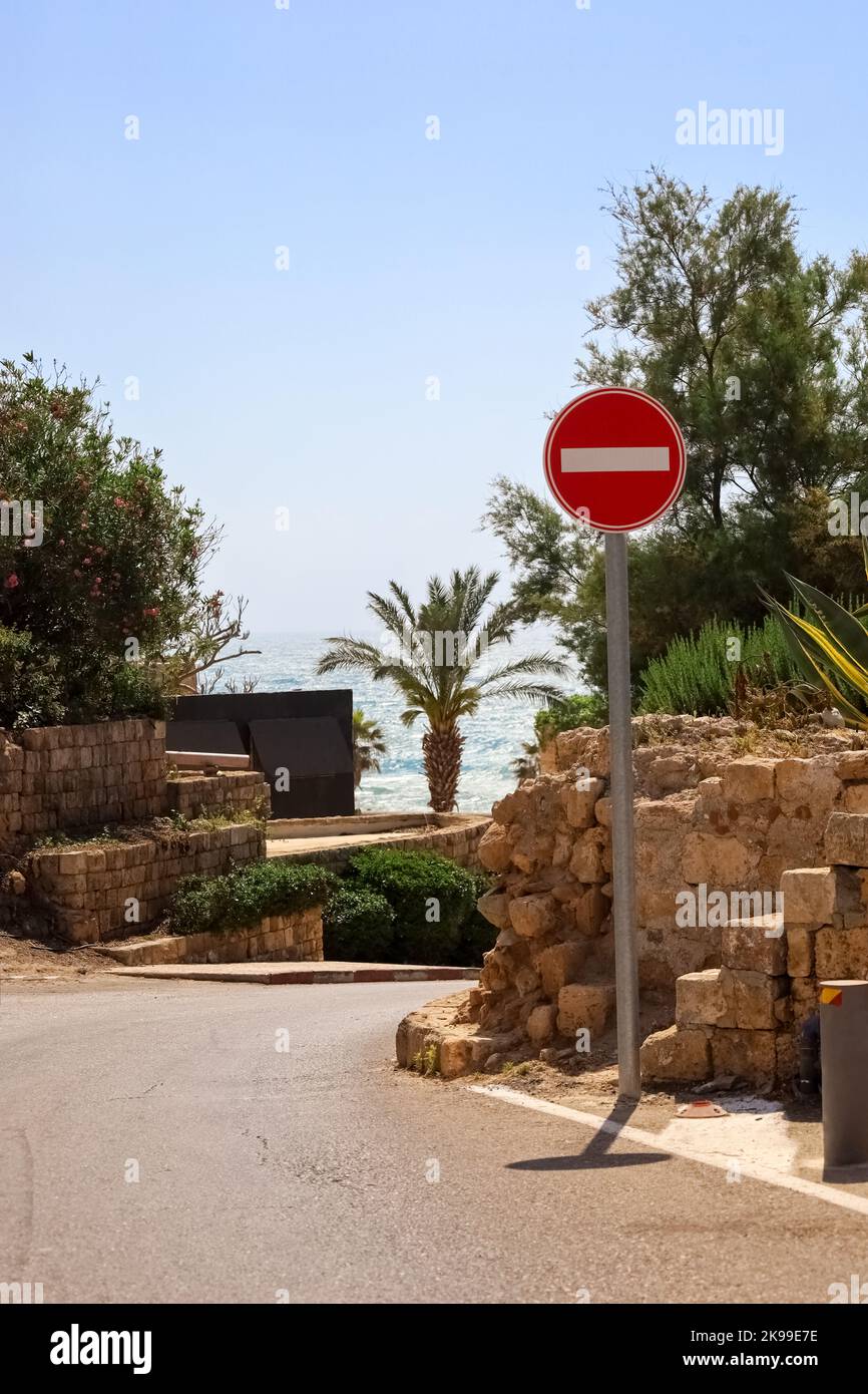 View of road with DO NOT ENTER sign at sea resort Stock Photo - Alamy