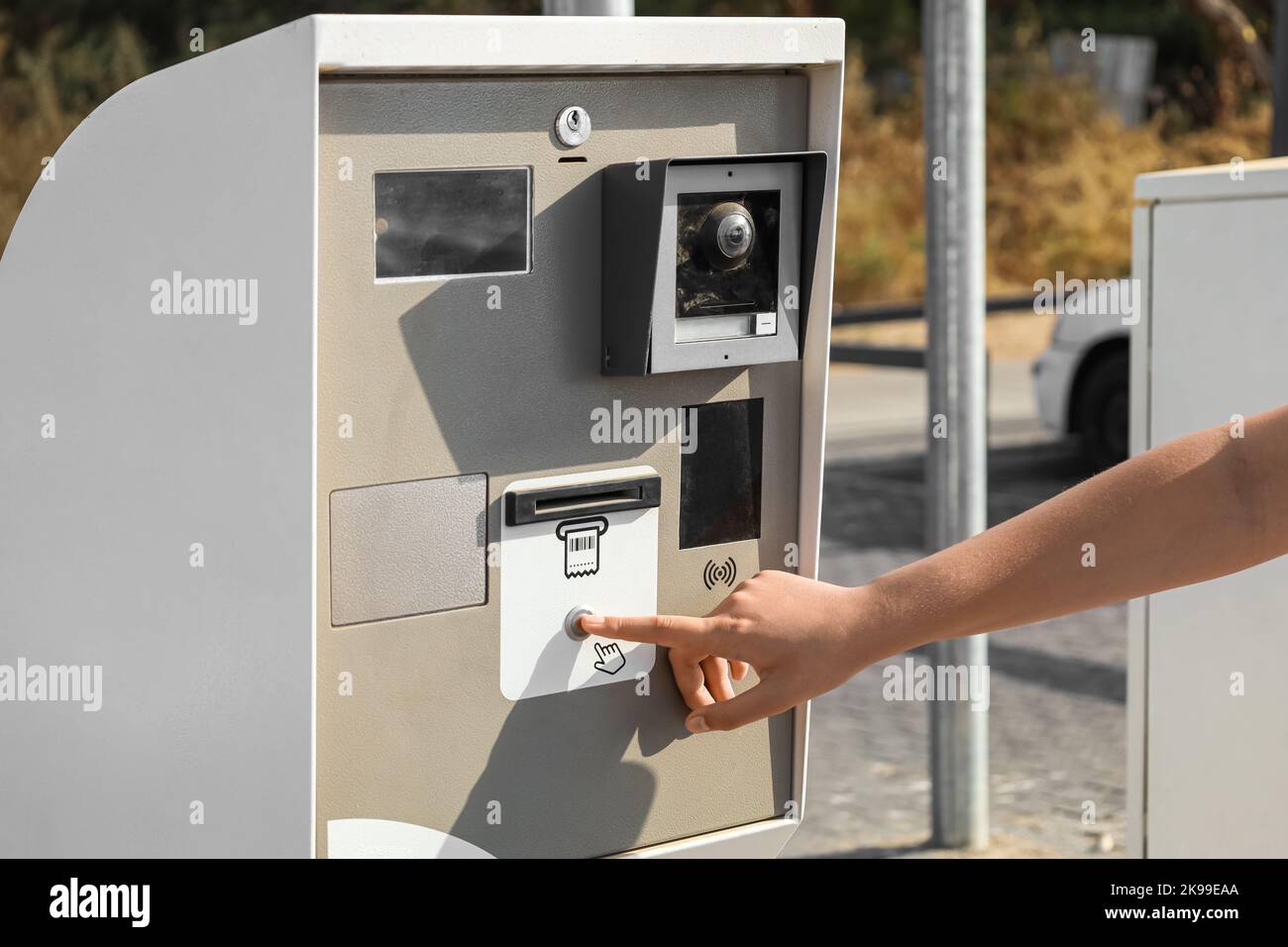 Woman using parking meter hi-res stock photography and images - Alamy