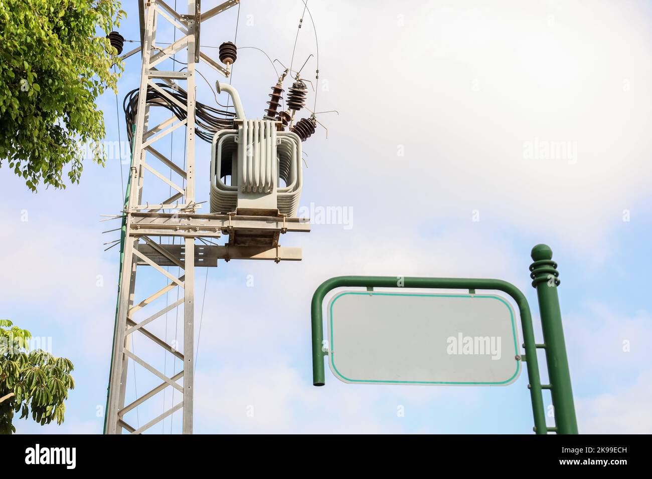 View of electric pole and blank signboard in city, closeup Stock Photo ...