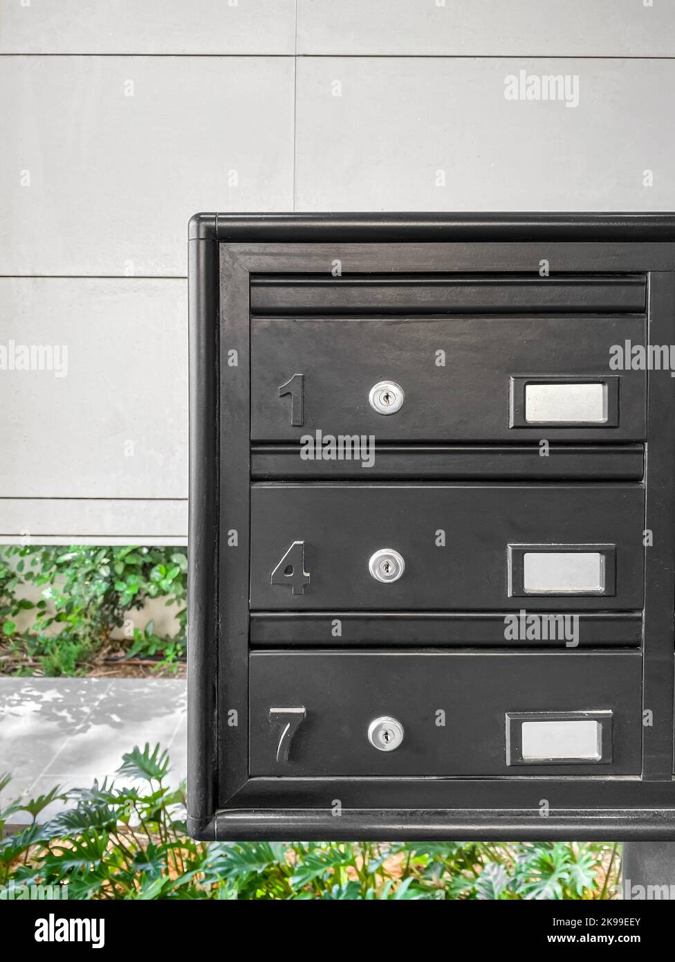 Modern mailboxes in residential building, closeup Stock Photo - Alamy