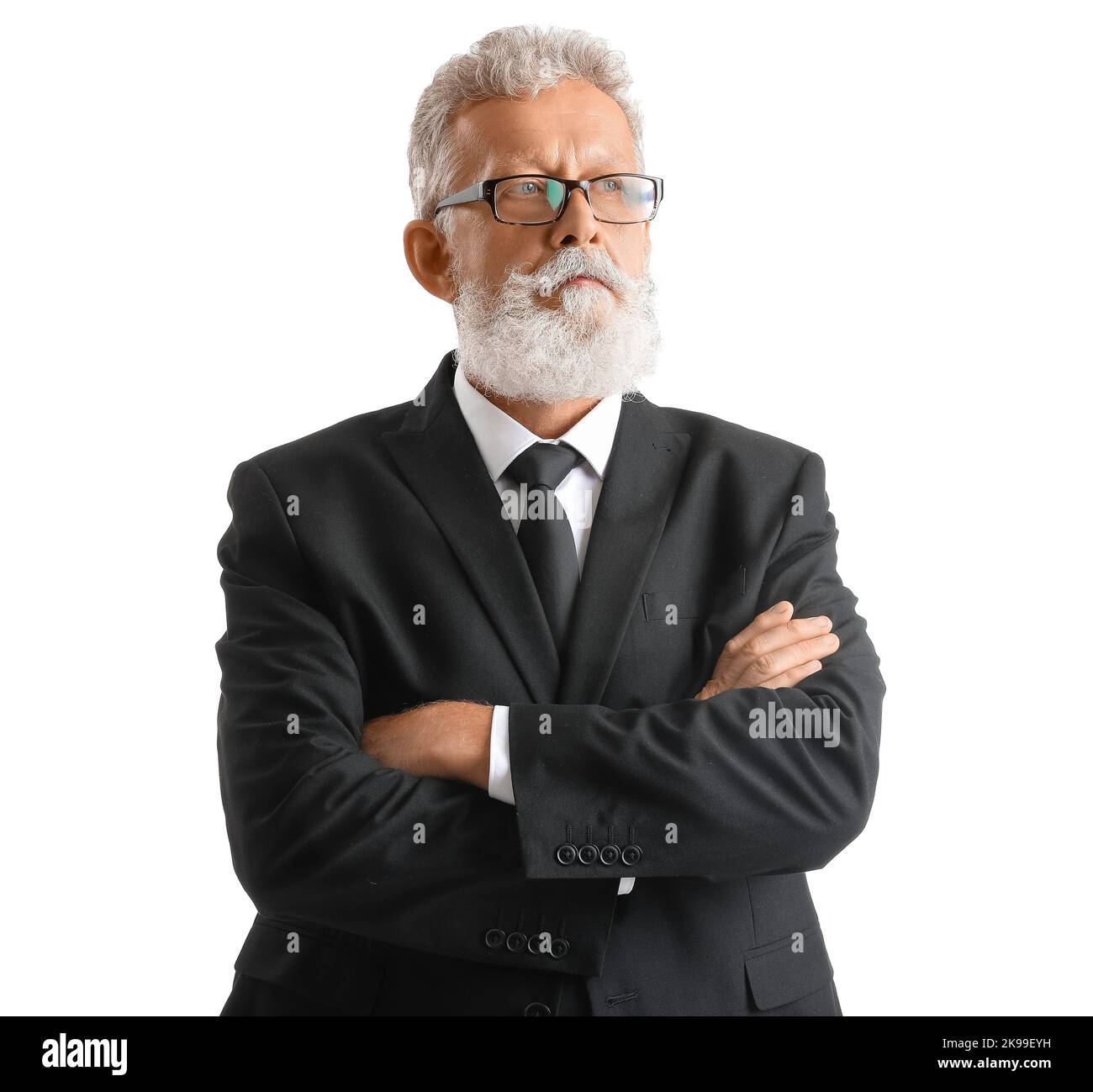 Senior Bearded Man In Eyeglasses And Black Suit On White Background