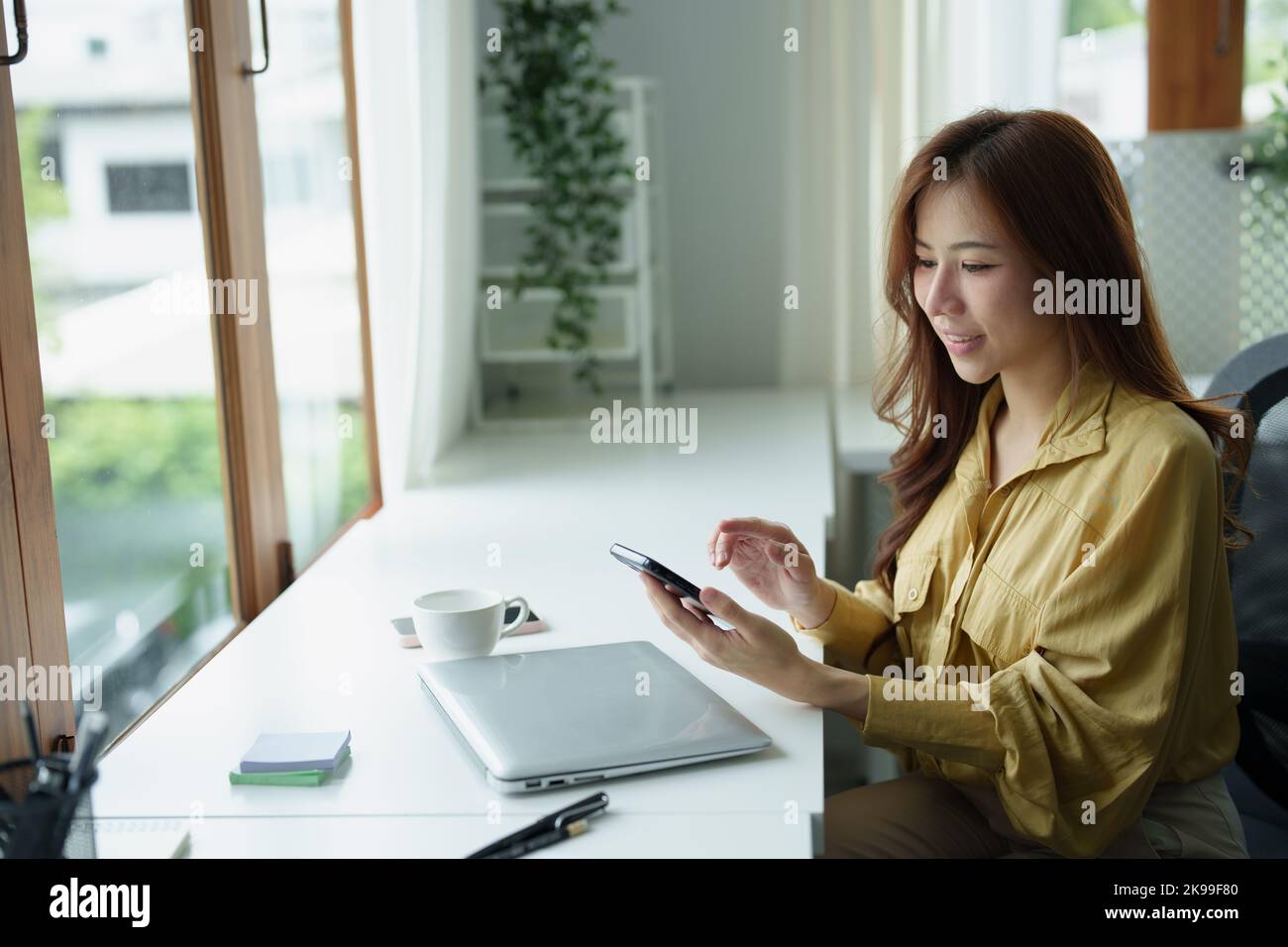 Woman taking break typing hi-res stock photography and images - Alamy