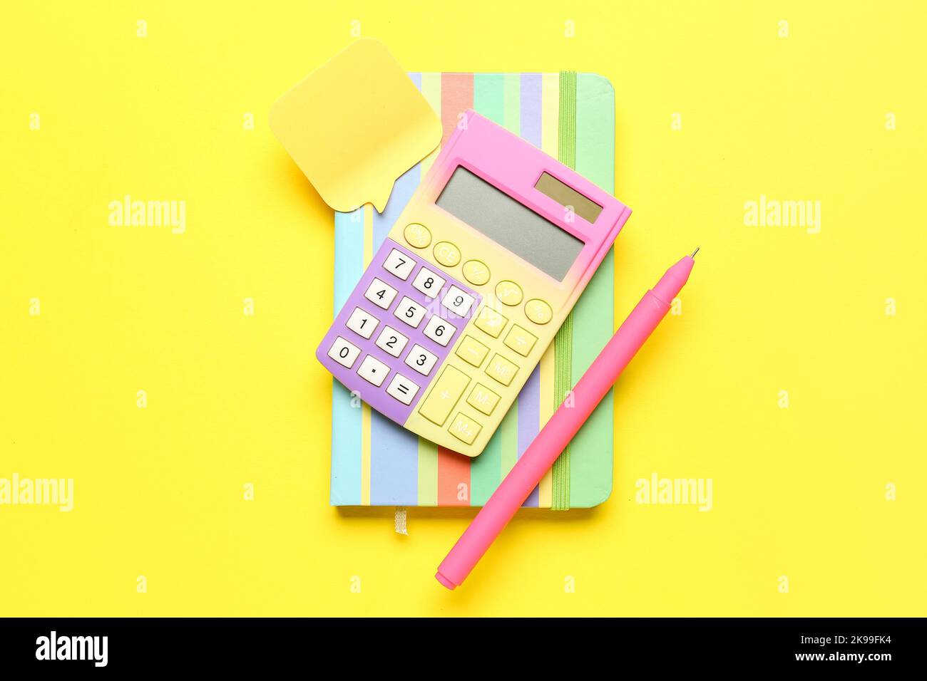 Calculator, notebook, pen and sticky note on color background. Money ...