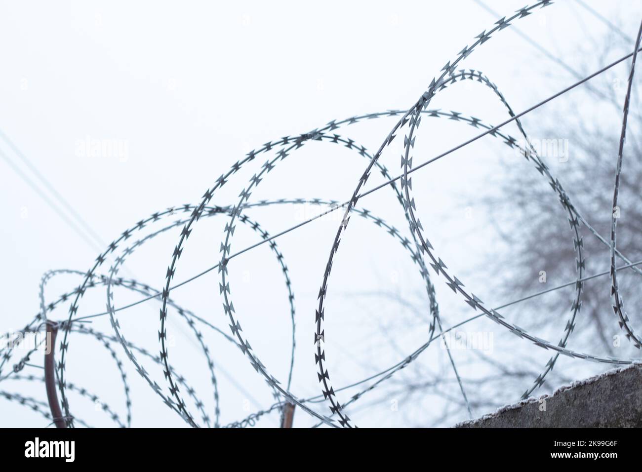Barbed wire coils hi-res stock photography and images - Alamy