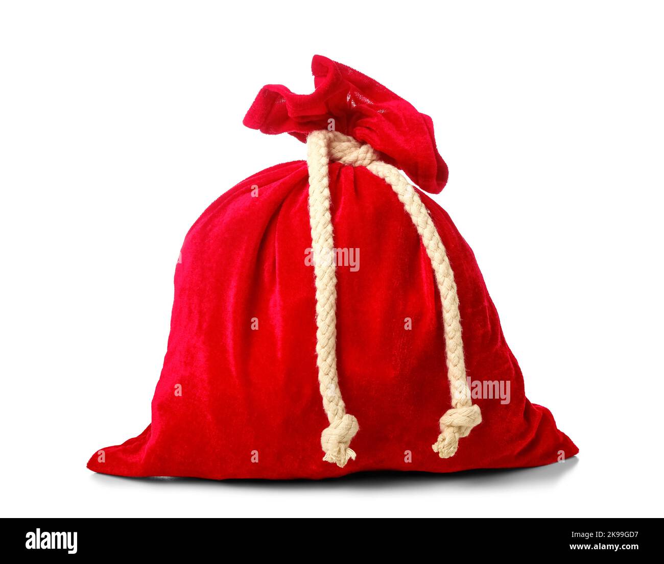 Red Santa Claus bag tied with rope on white background Stock Photo - Alamy