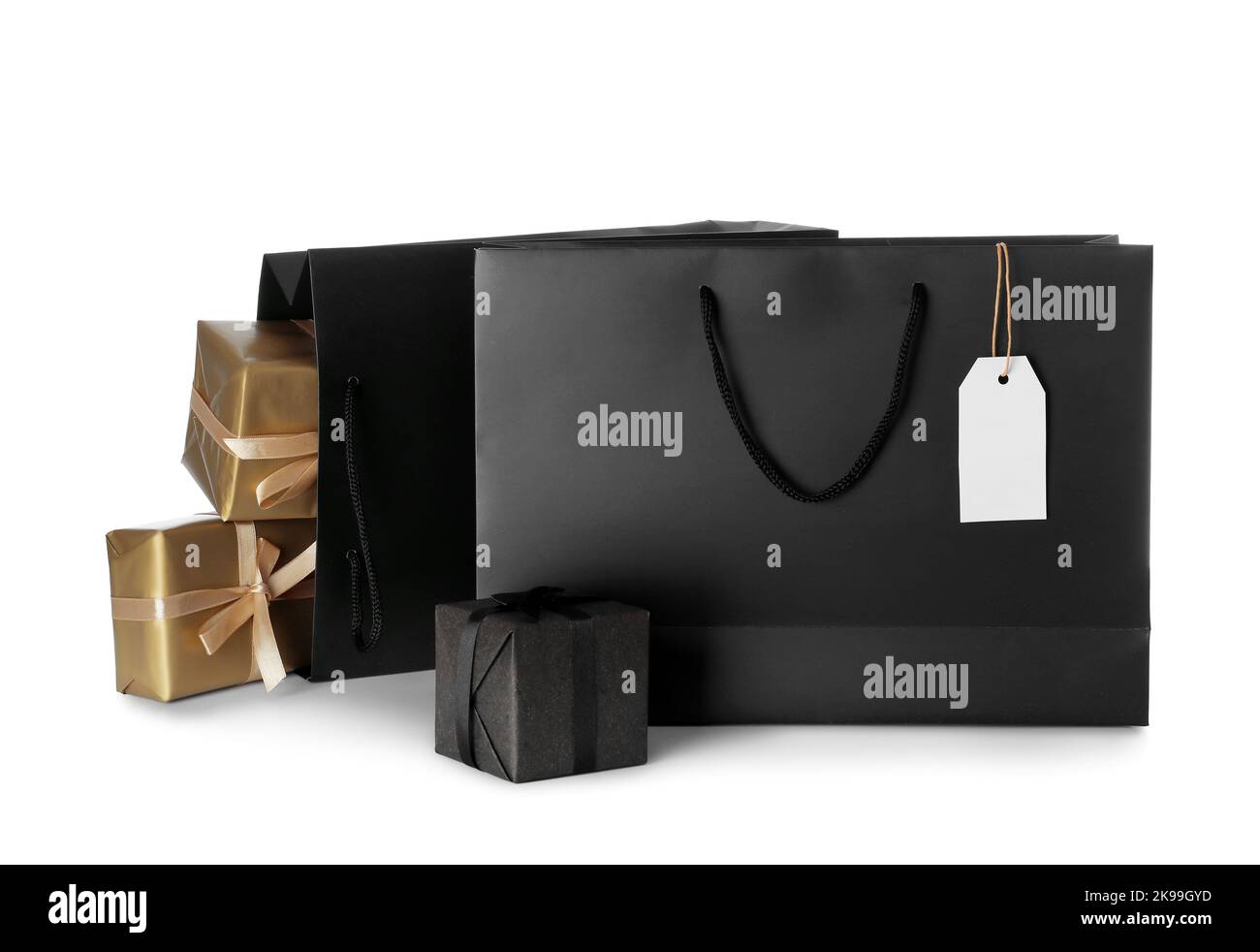 Shopping bags with gift boxes on white background. Black Friday sale ...