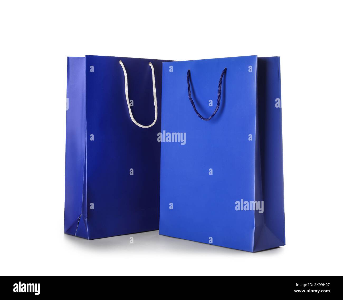 Blue shopping bags on white background. Black Friday sale Stock Photo ...