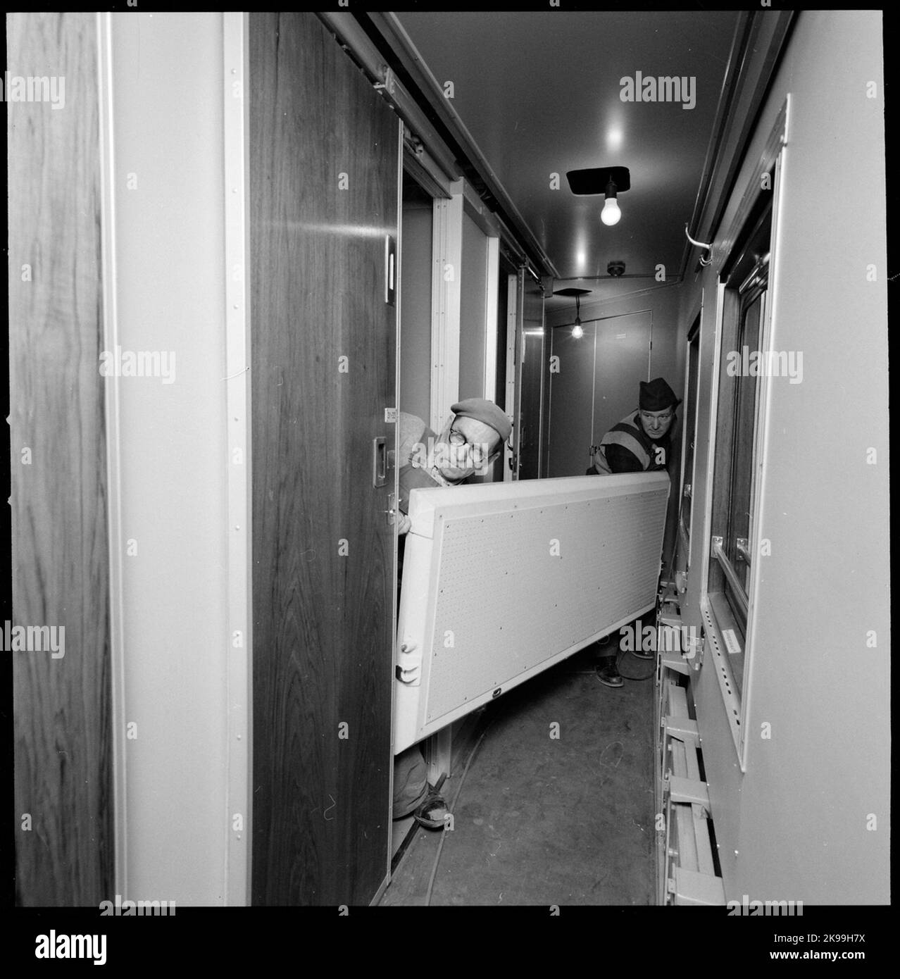 Mounting work in sleeping compartment Stock Photo - Alamy