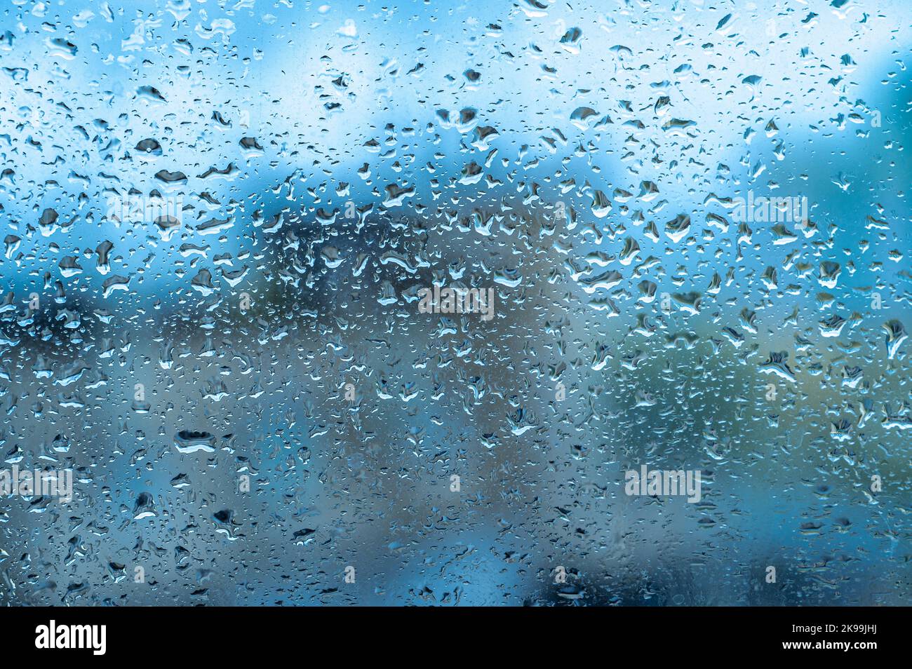 Rainy background, rain drops on the window, autumn season backdrop ...