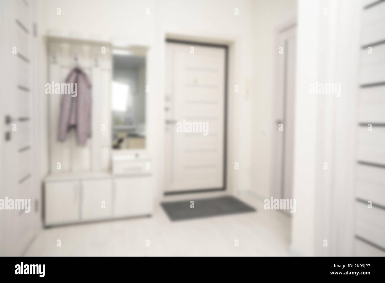 Hallway in apartment blurred background. small entrance hall in light ...