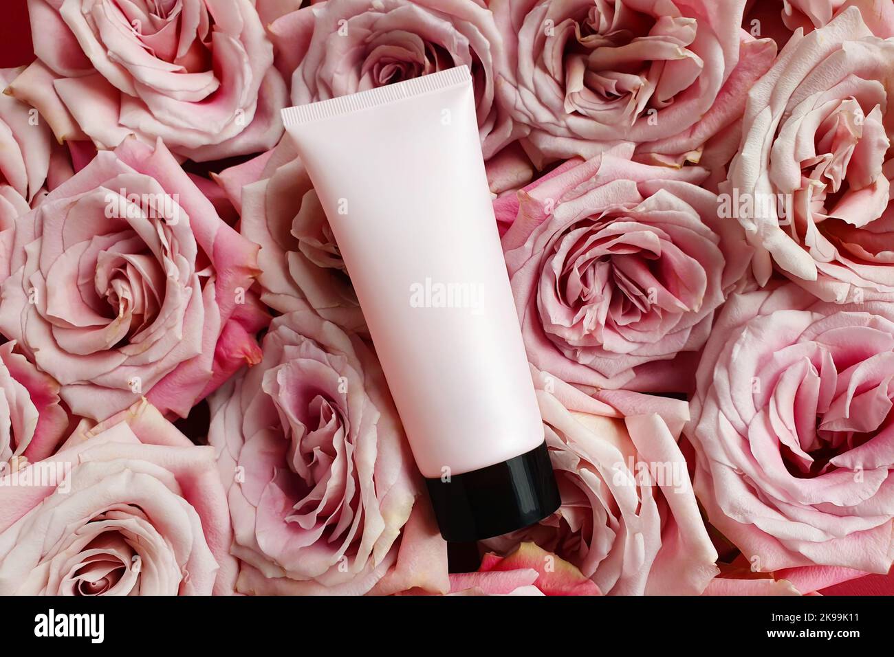 Unbranded pink squeeze bottle cream tube with black screw cap and pink ...