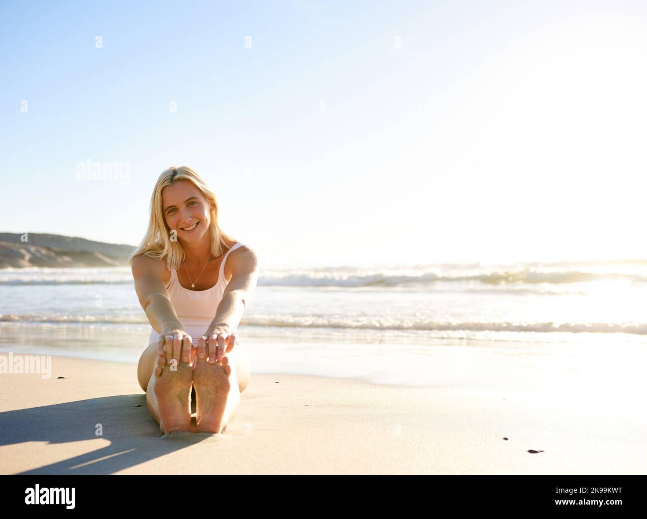 My happy place. Full length shot of an attractive young woman in a ...