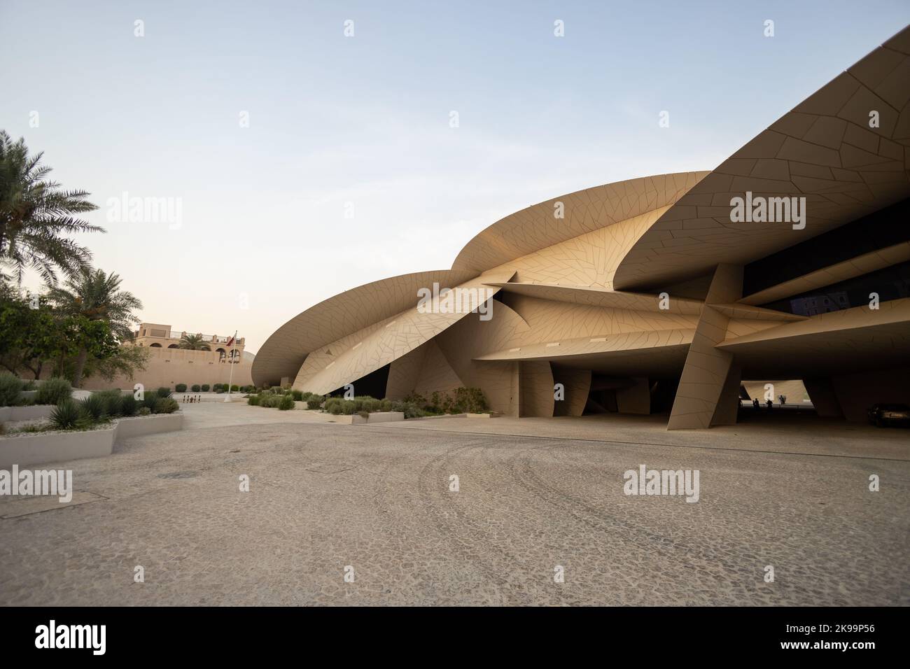 An aerial view of National Museum building facade of Qatar under blue ...