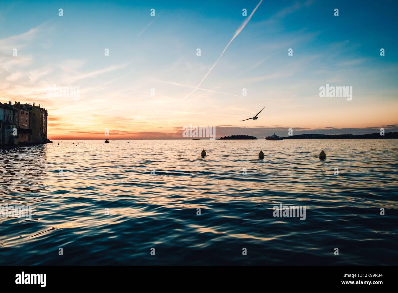 Flight over the sea during golden hour hi-res stock photography and ...