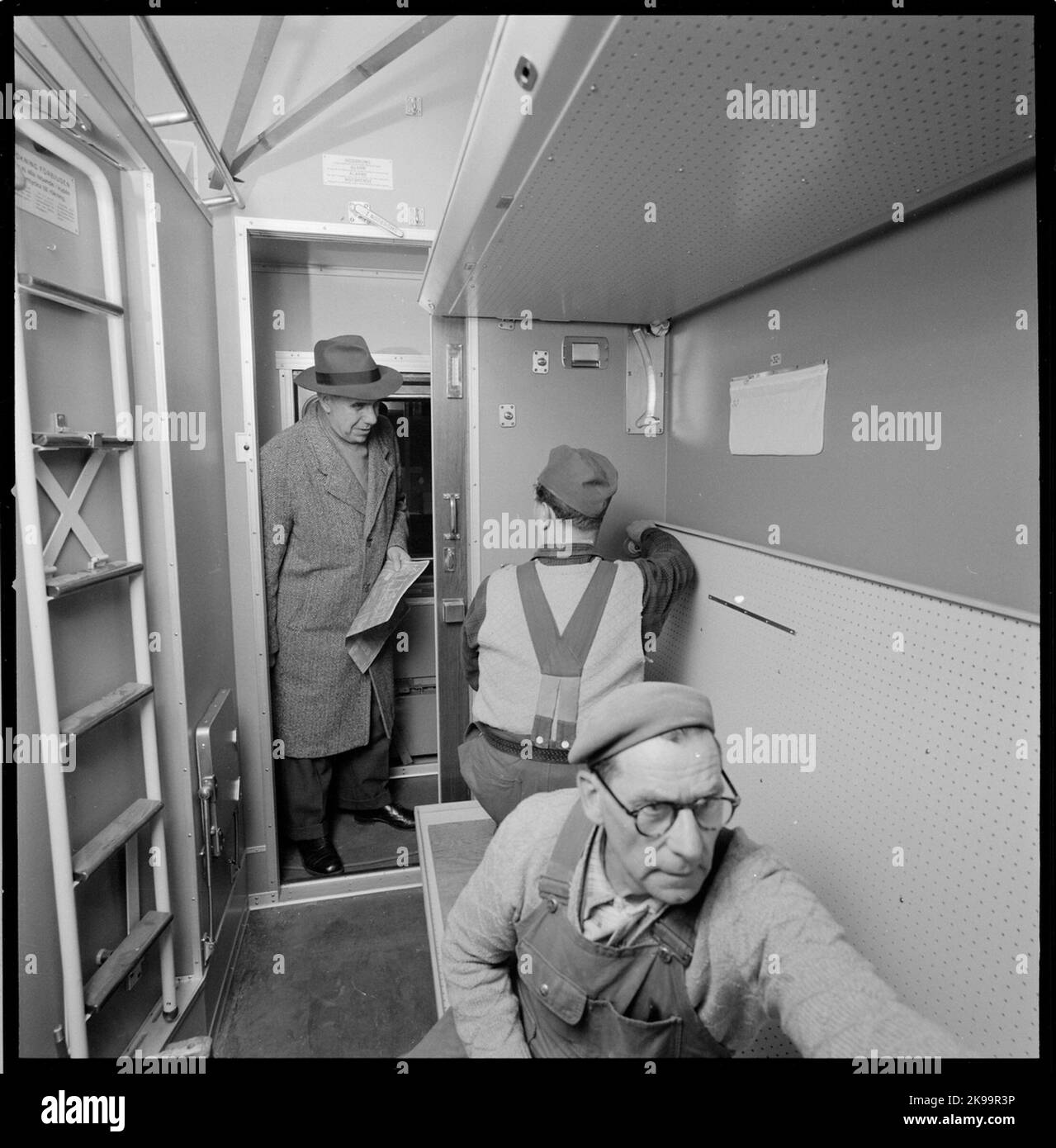 Mounting work in sleeping compartment Stock Photo - Alamy